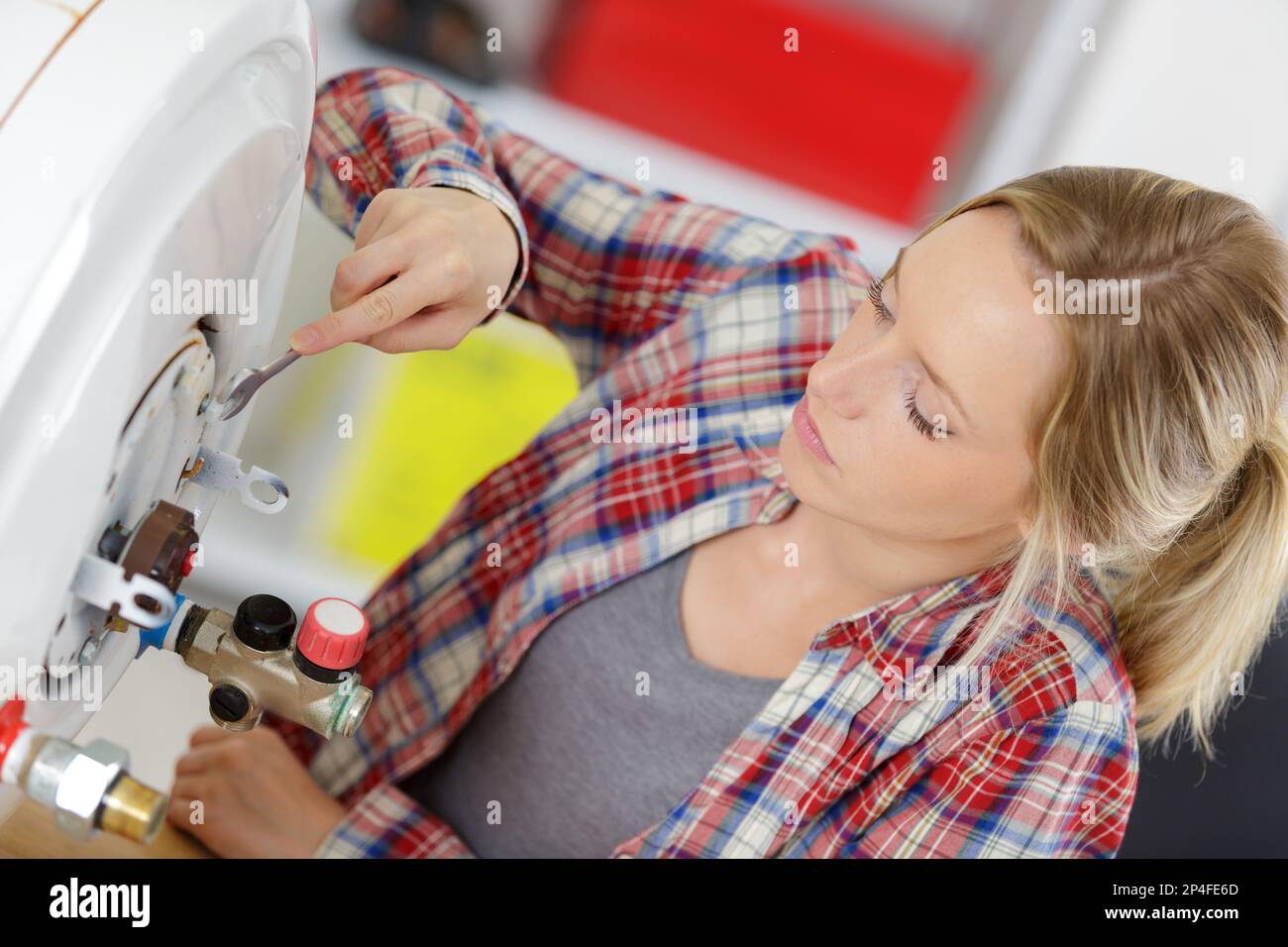 Engineer fixing a boiler hi-res stock photography and images - Alamy