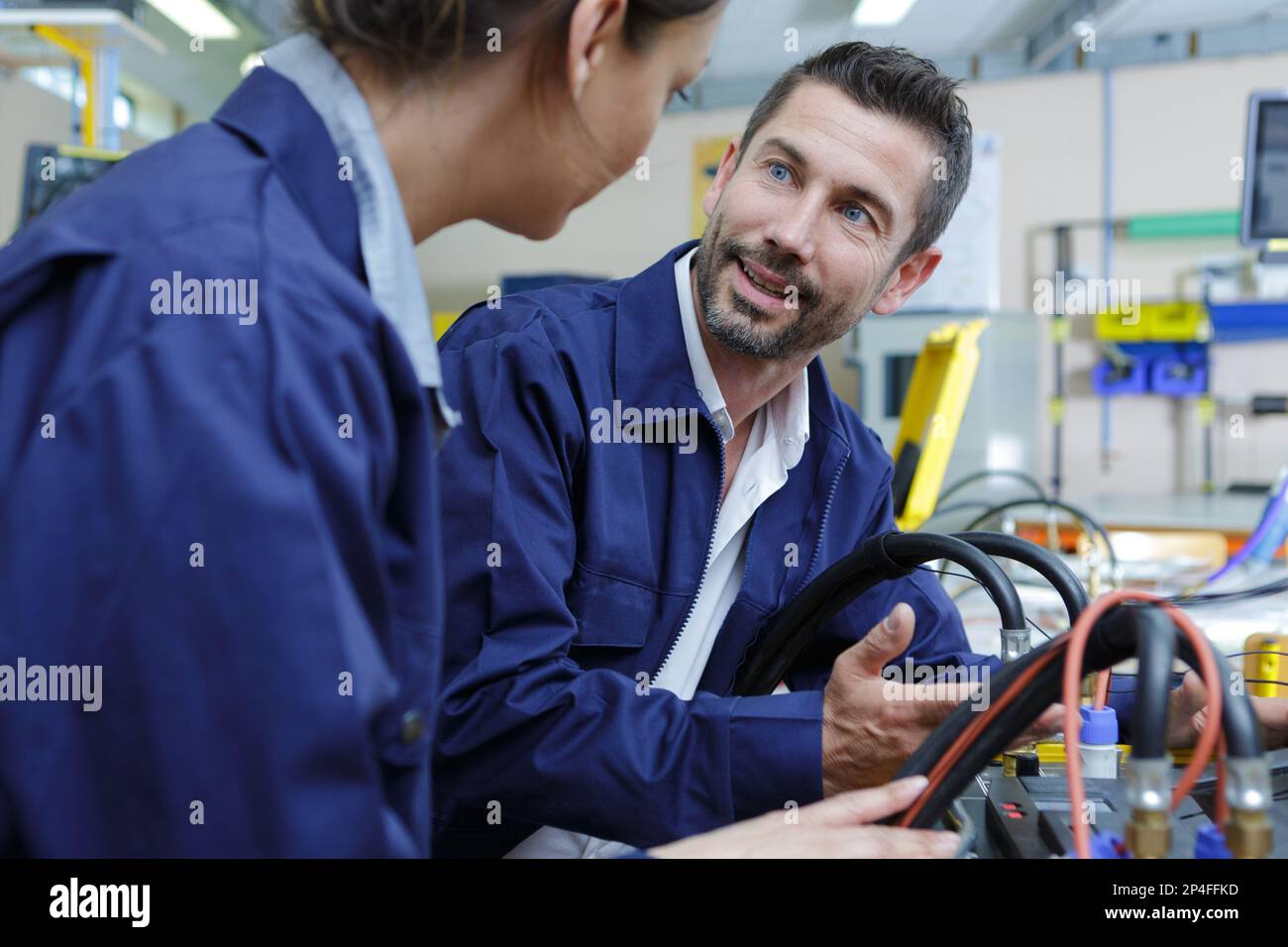 Mechanics talking customer car hi-res stock photography and images - Alamy