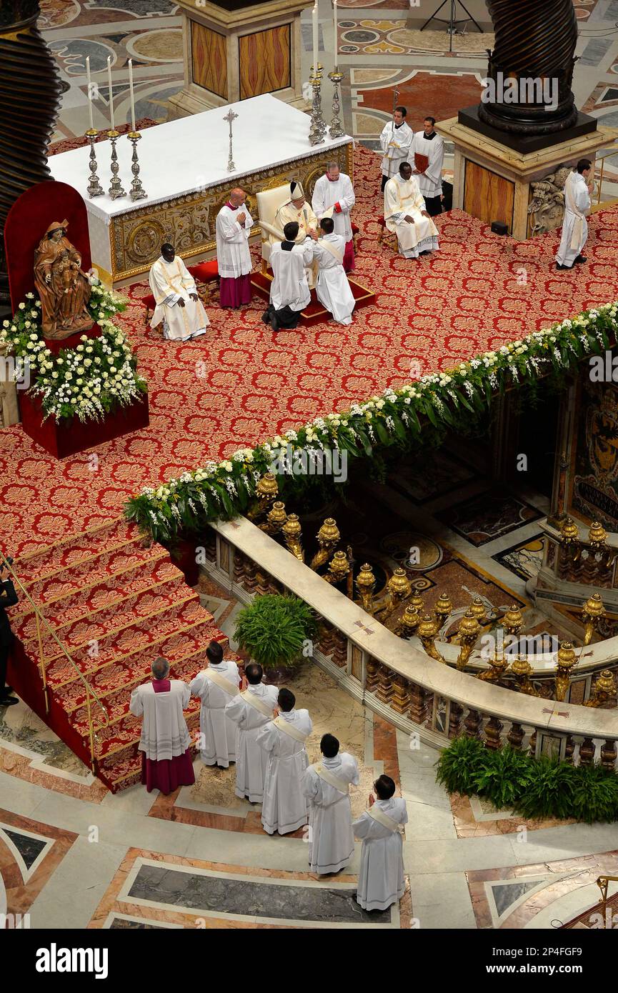 Pope Francis celebrates a Mass where he ordained 13 new priests in St ...