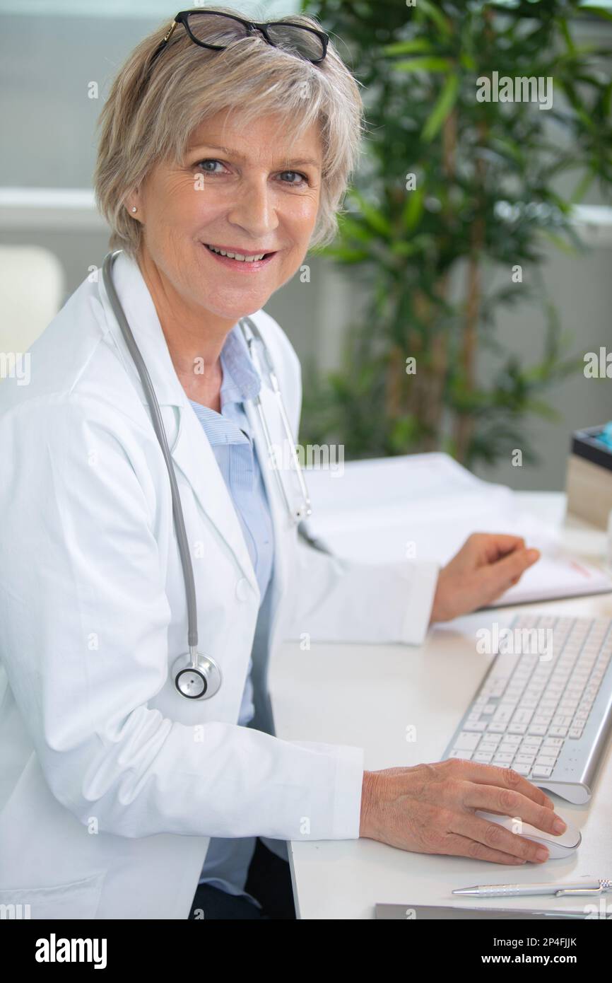 Female administrative working in hi-res stock photography and images ...