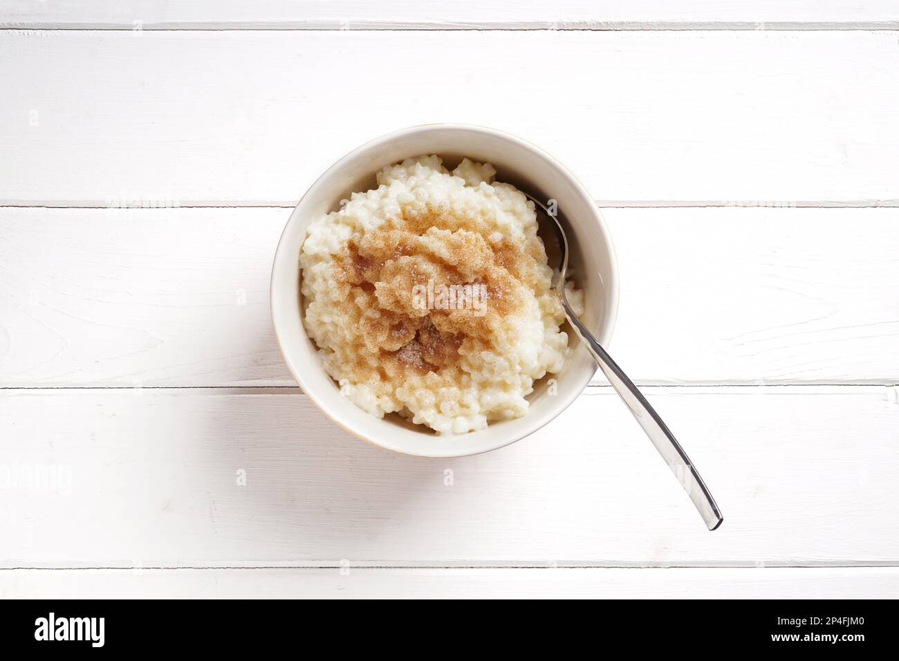 traditional german rice pudding with cinnamon and sugar, known as ...