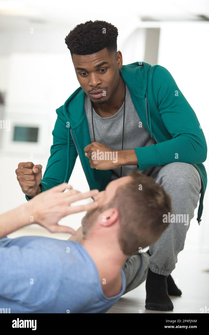 exercise wheel training with coach Stock Photo - Alamy