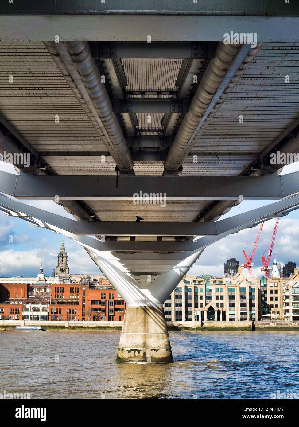 Underneath the Millennium Bridge in London Stock Photo - Alamy