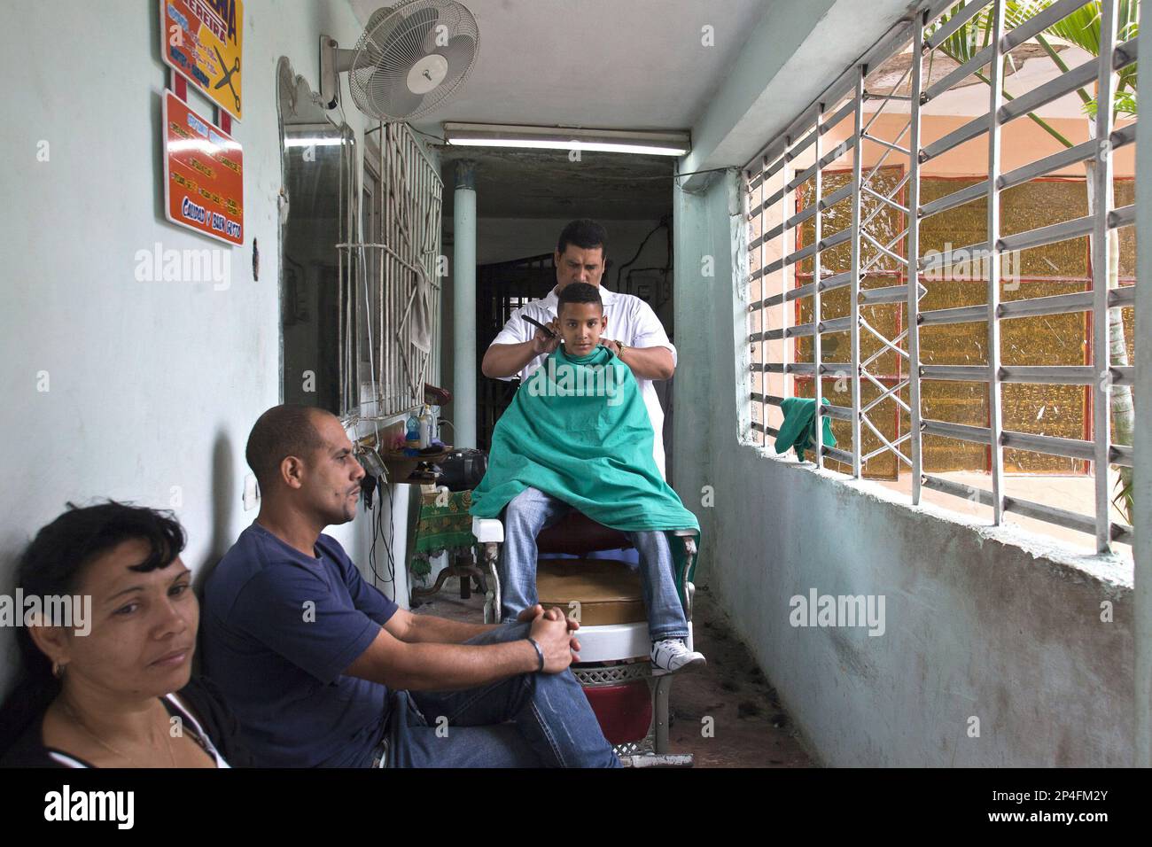 Private barber shop in Havana Stock Photo - Alamy