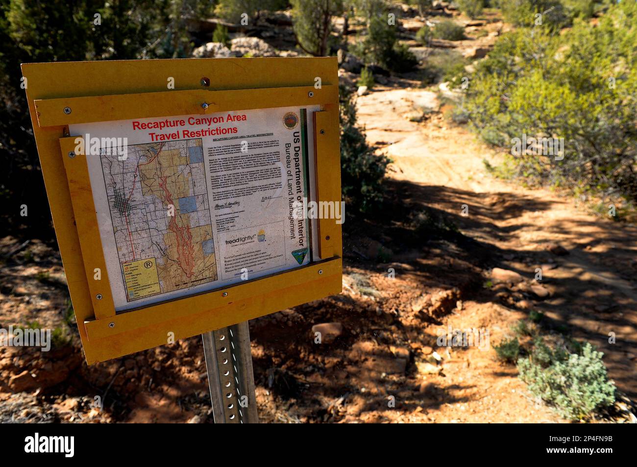 This April 26, 2014 photo shows signs posted from 2007 detail travel ...