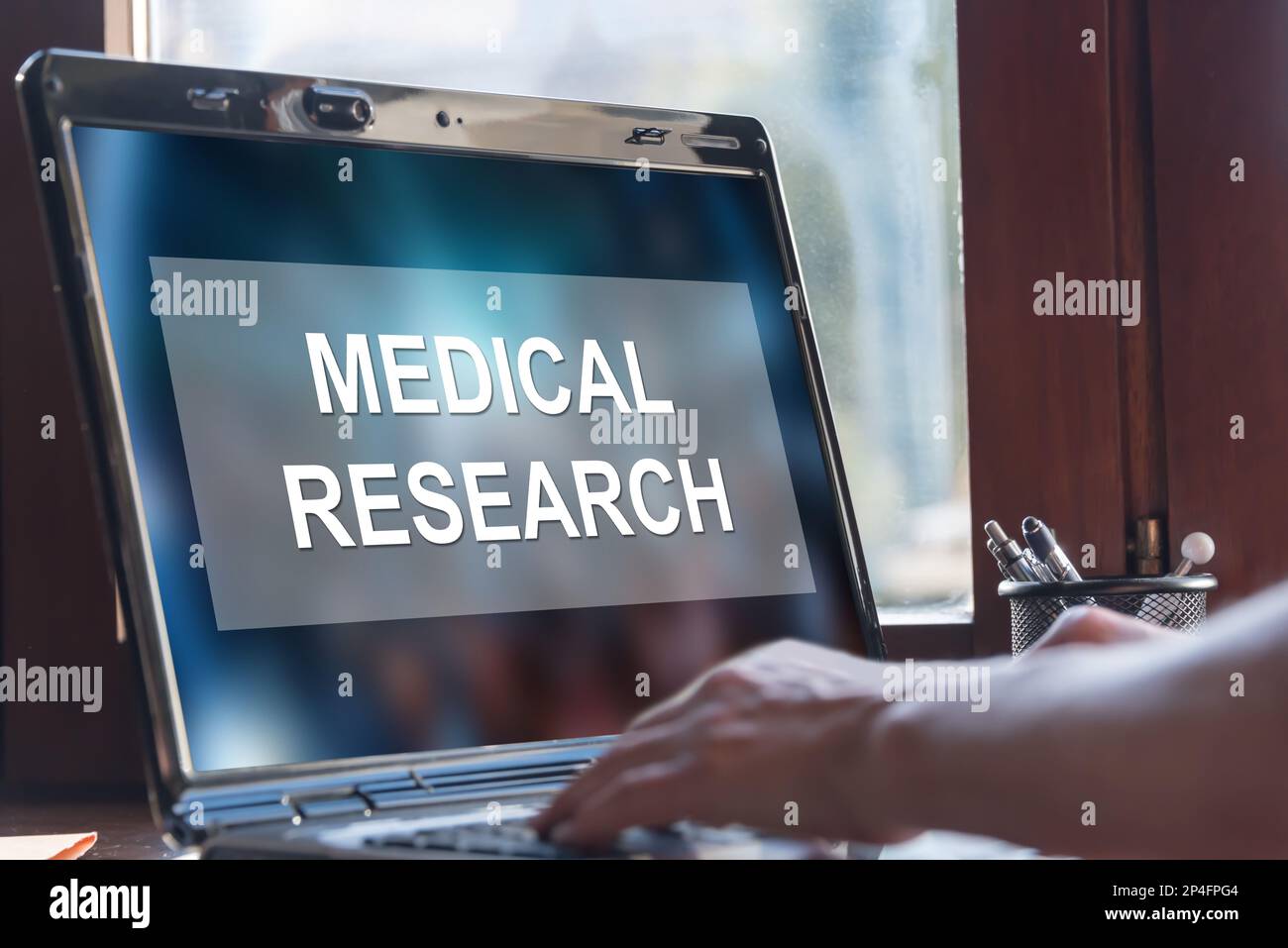 Laptop screen displaying a medical research concept Stock Photo - Alamy
