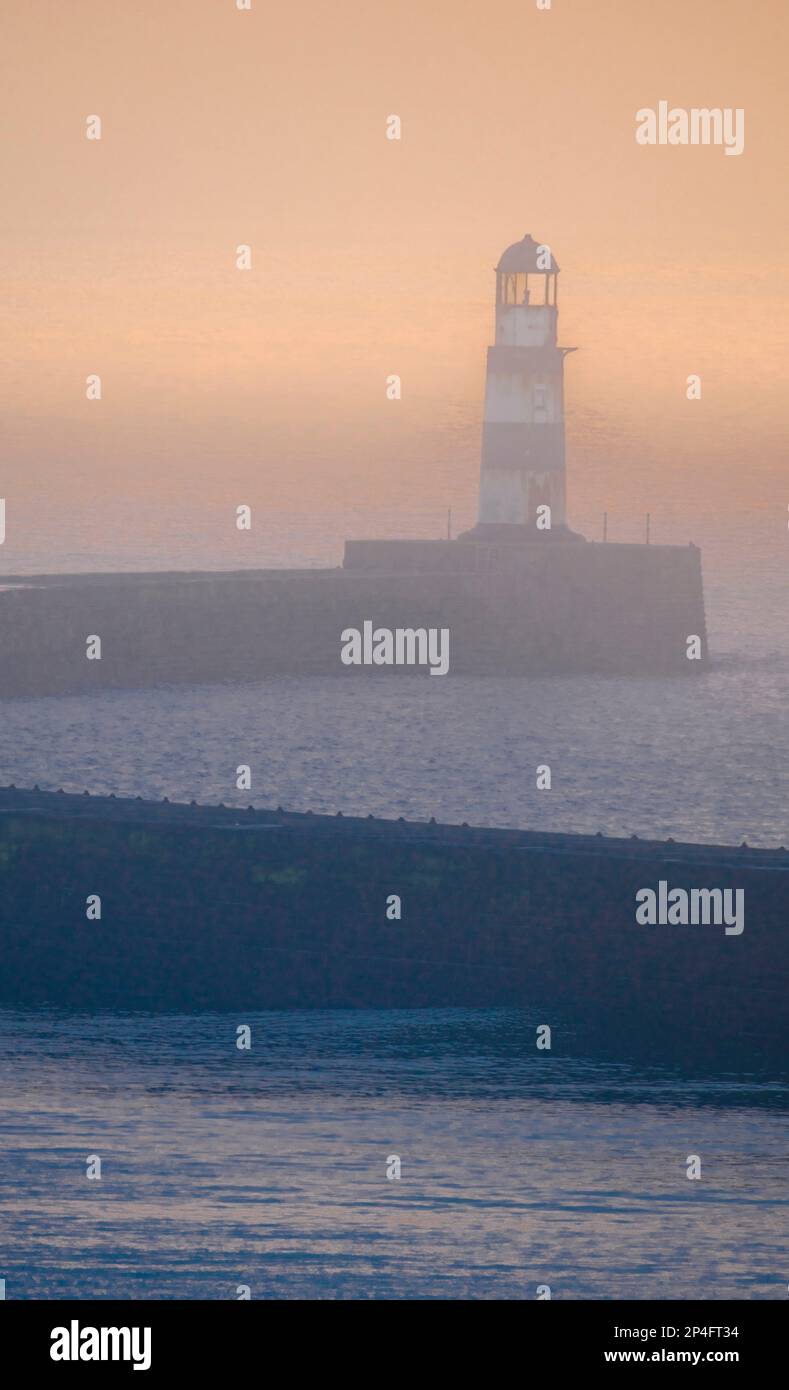 Seaham lighthouse on foggy winter hi-res stock photography and images ...