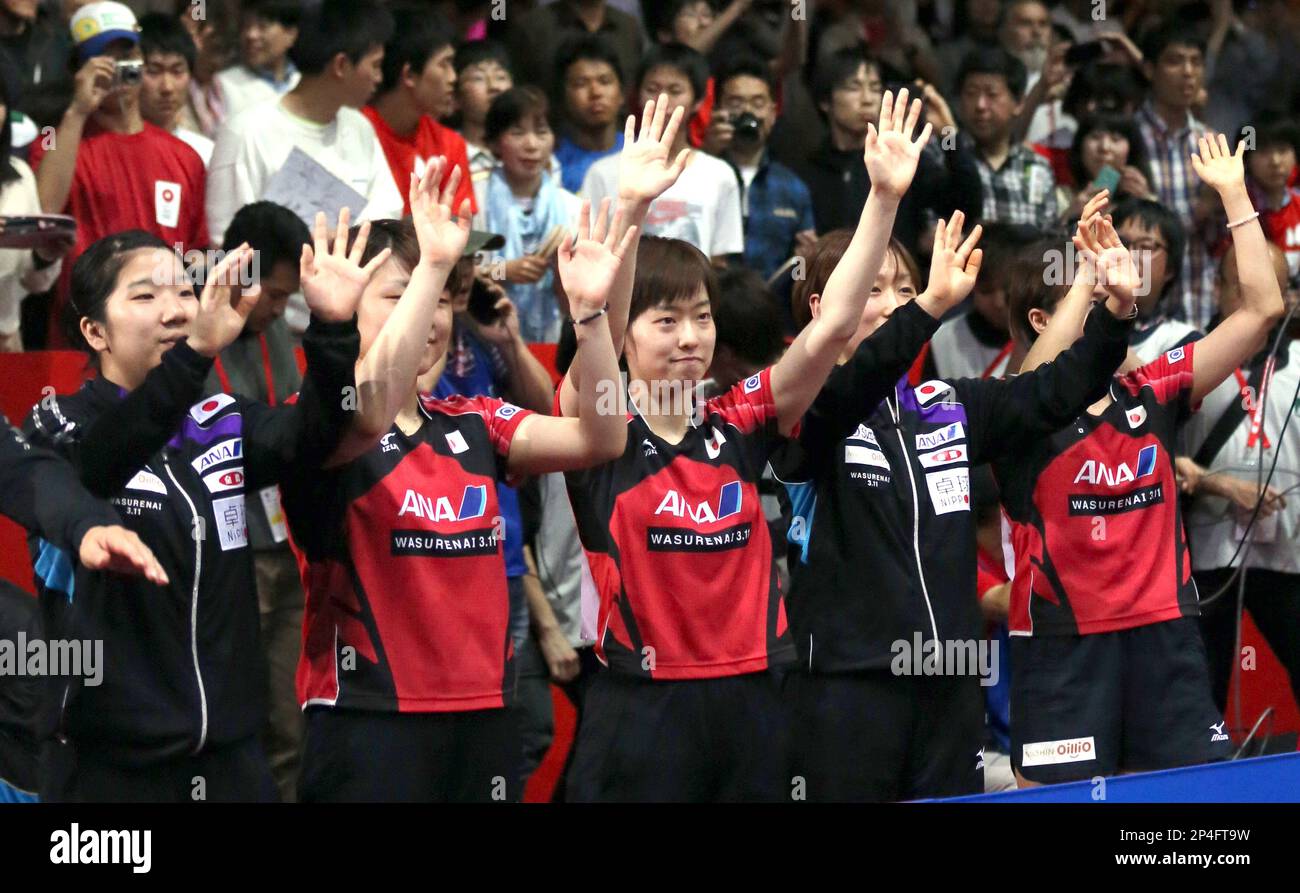 Japan team member's Kazumi Ishikawa ( 3rd from L) responds with other ...