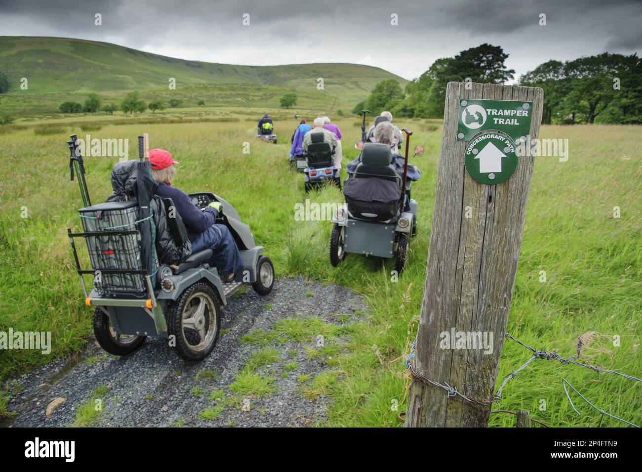 Tramper trail and concession trail signs at post, people with mobility ...