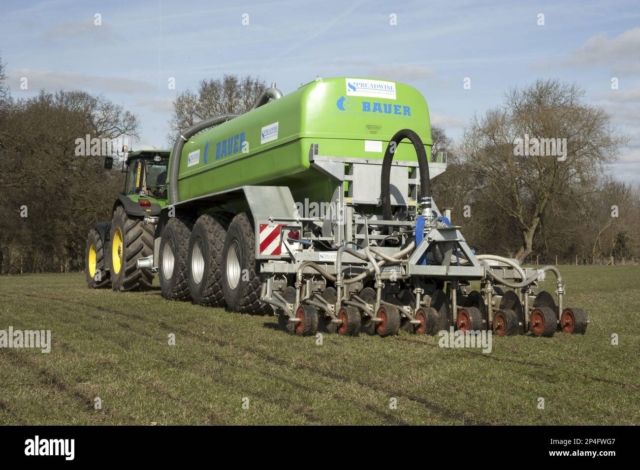 Slurry tanker farmer with Spreadwise slurry injector applying slurry to ...
