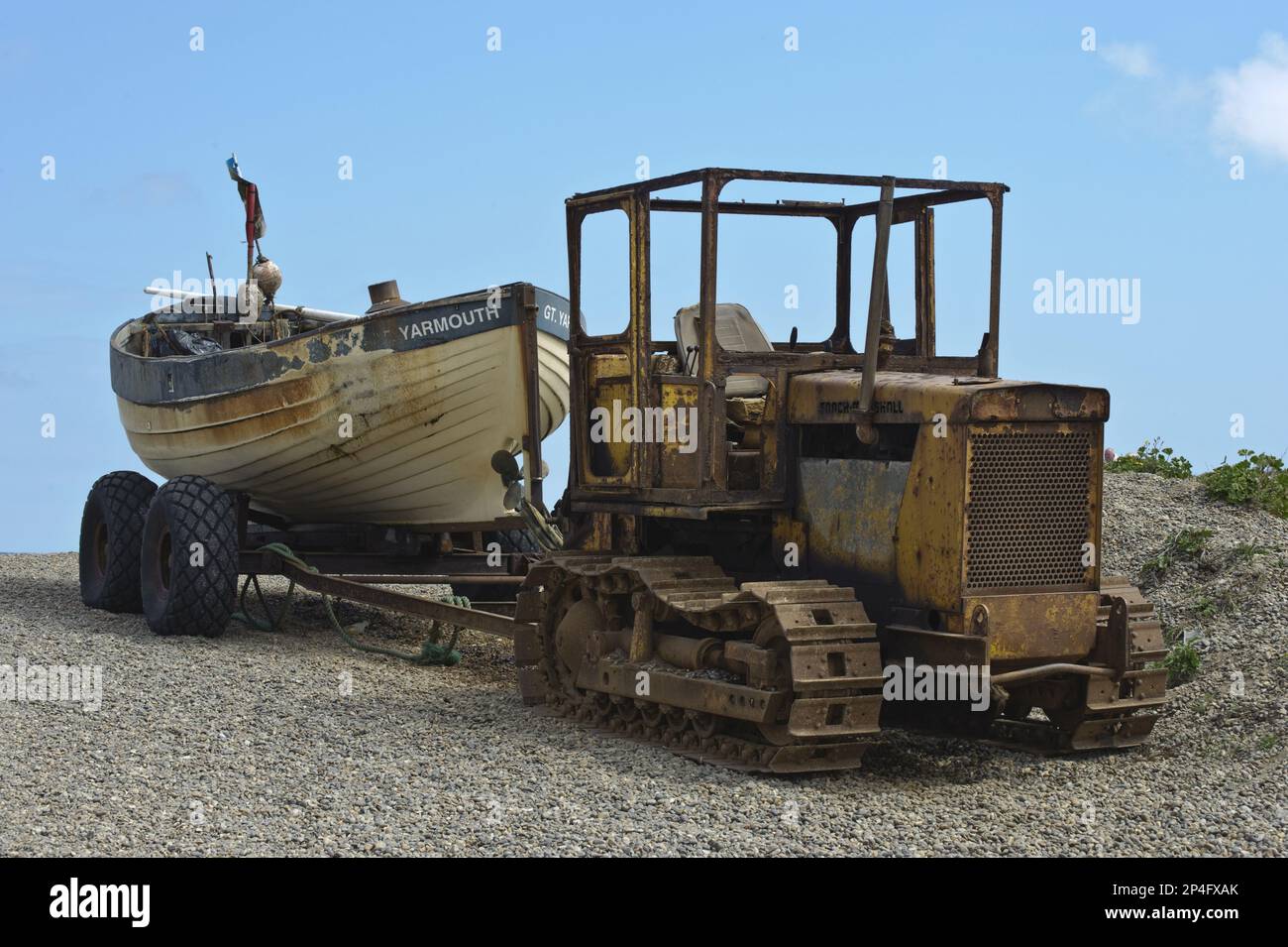 Tractor lands fishing boat on beach, Weybourne, Norfolk, England ...