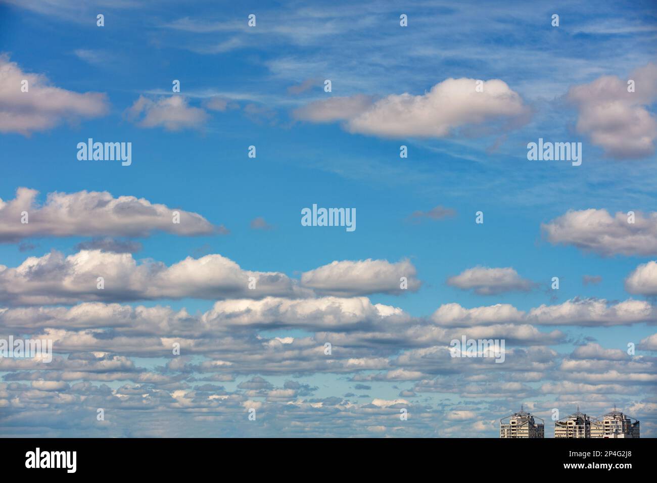 A beautiful blue sky with clouds extending into the distance to the ...