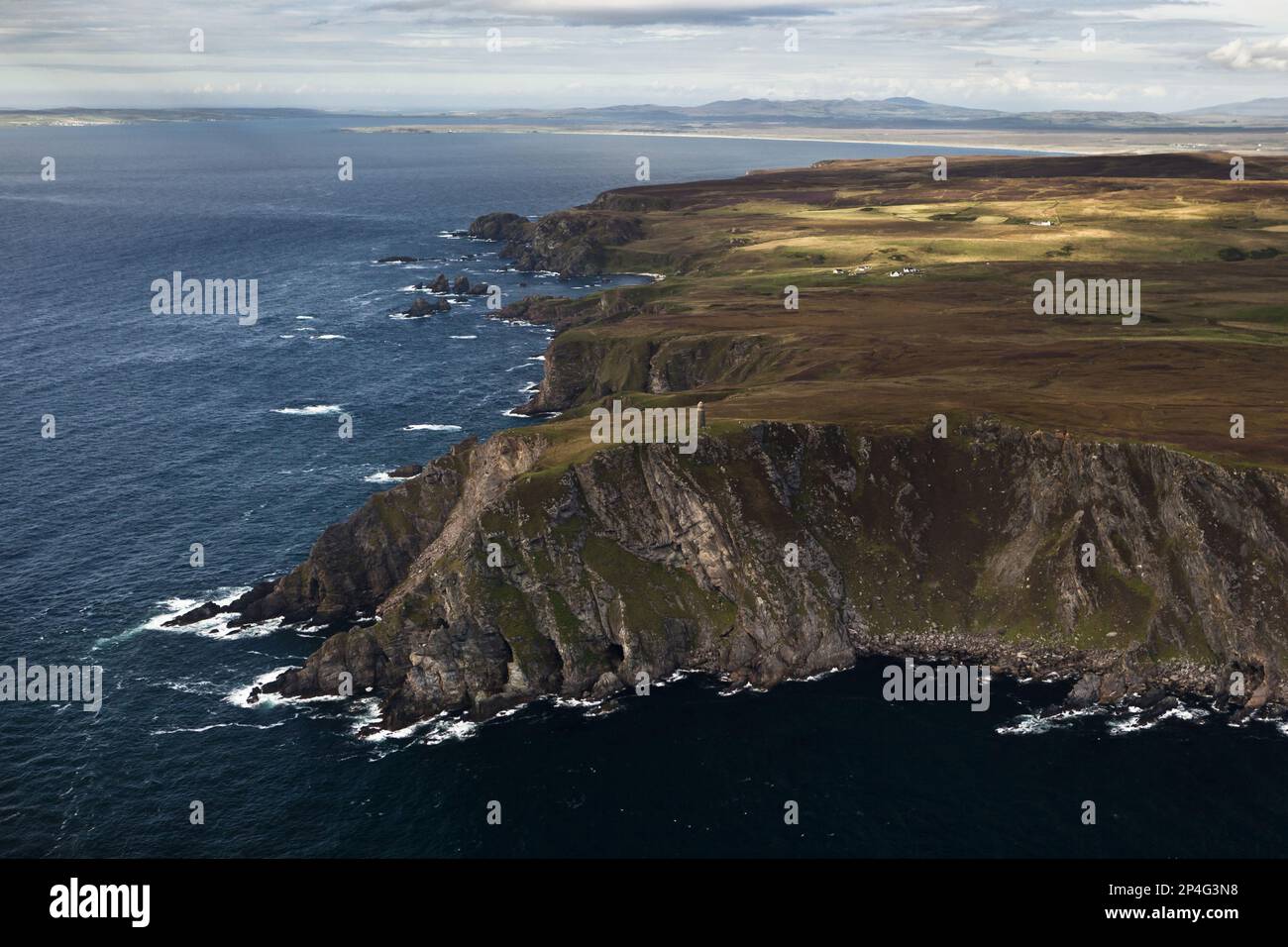 Aerial view of coastline with cliffs and commemorative monument ...