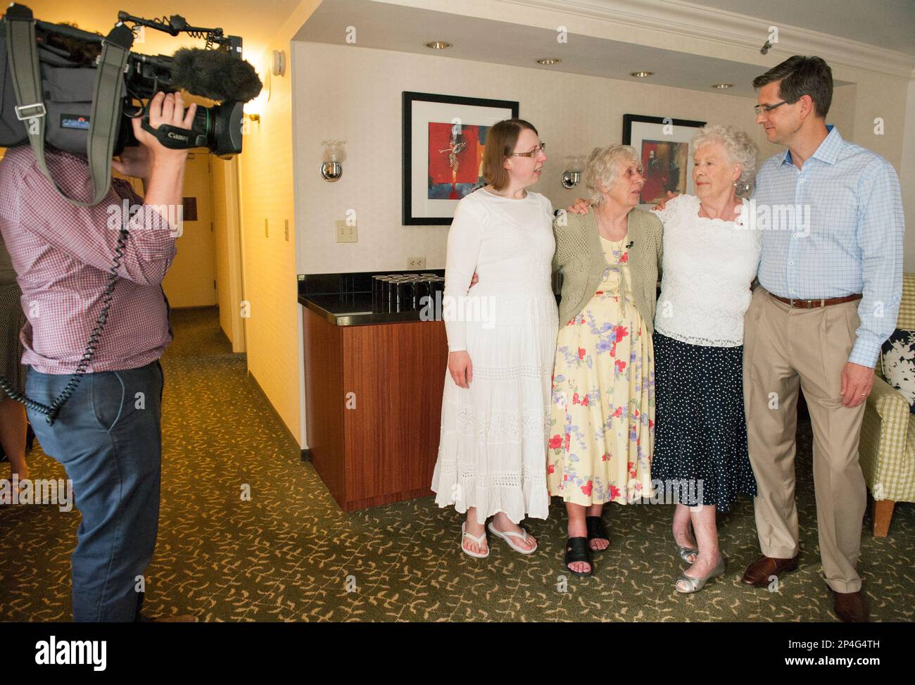 A television crew from the BBC records the May 1, 2014 reunion at the ...