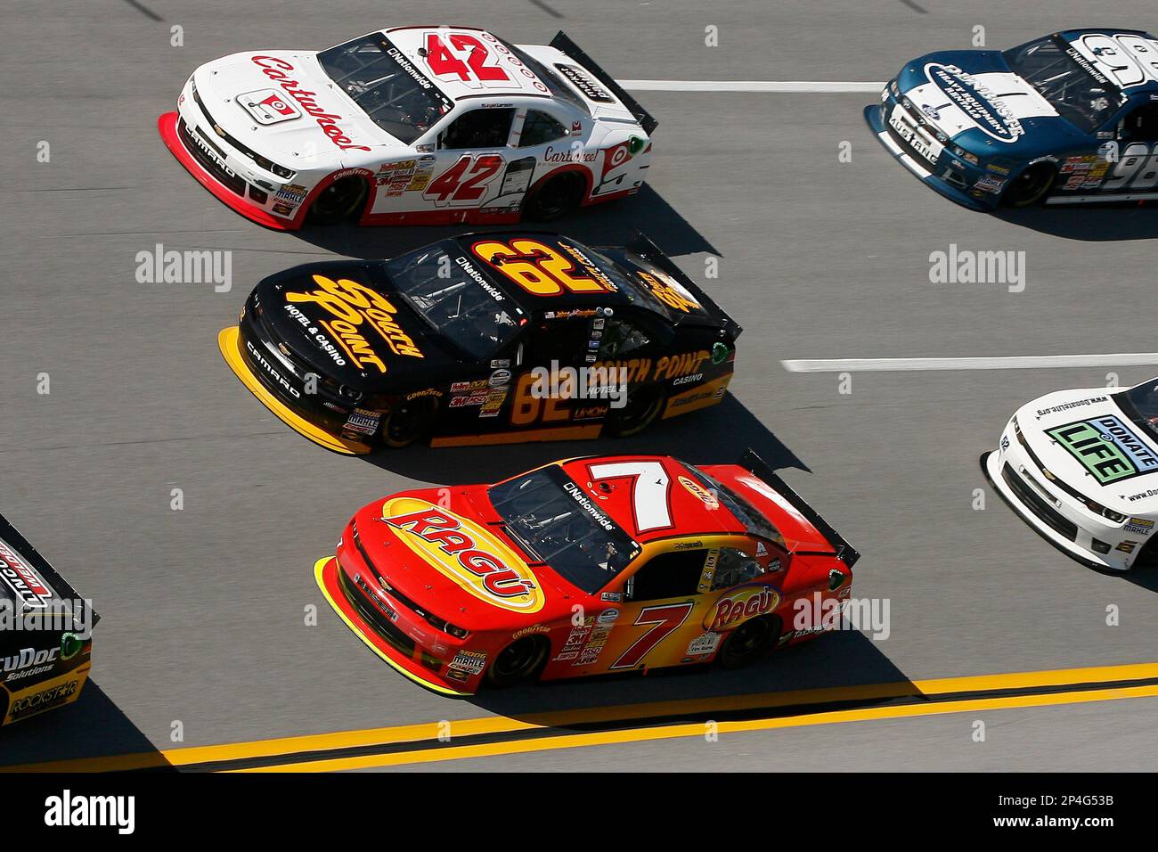 Regan Smith (7), Brendan Gaughan (62) and Kyle Larson (42) during the ...