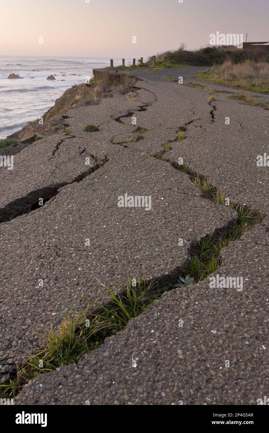 Erosion of sea cliffs with damaged road, Route 1, Westport, North ...