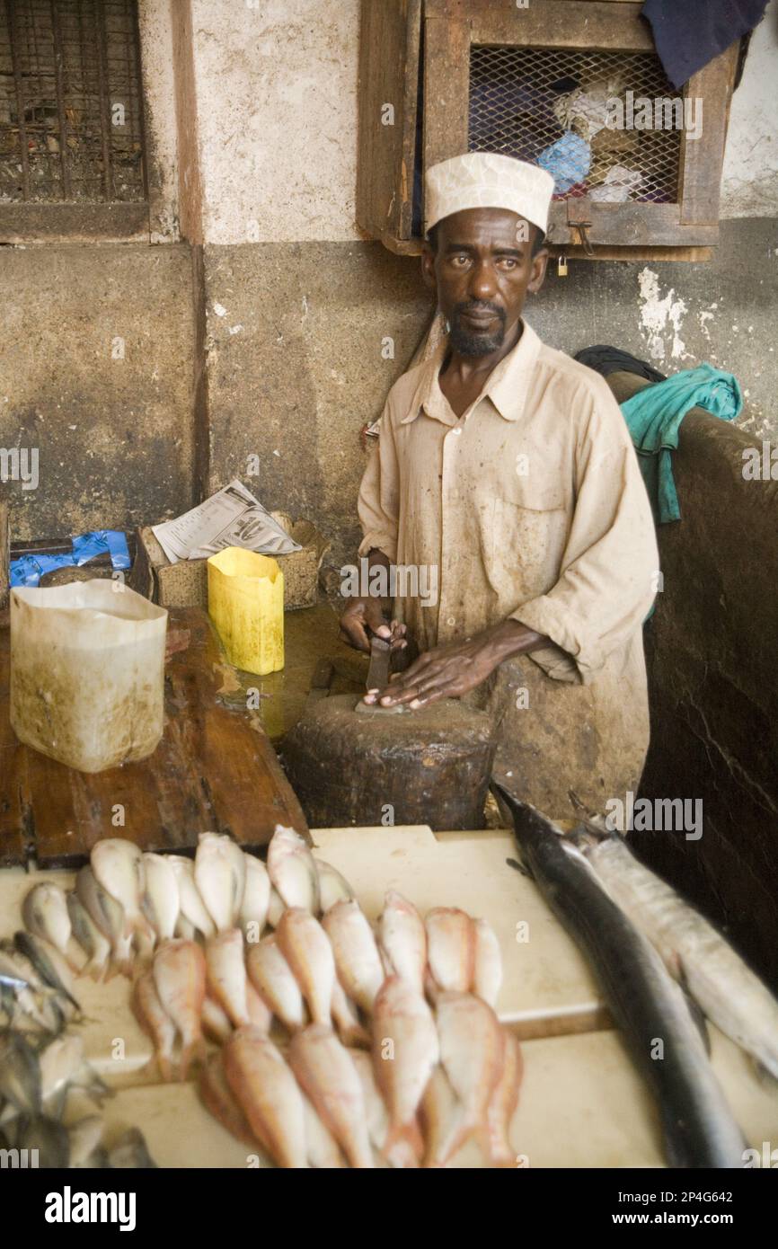 Fishmonger at the urban fish market, Stonetown, Unguja, Zanzibar ...