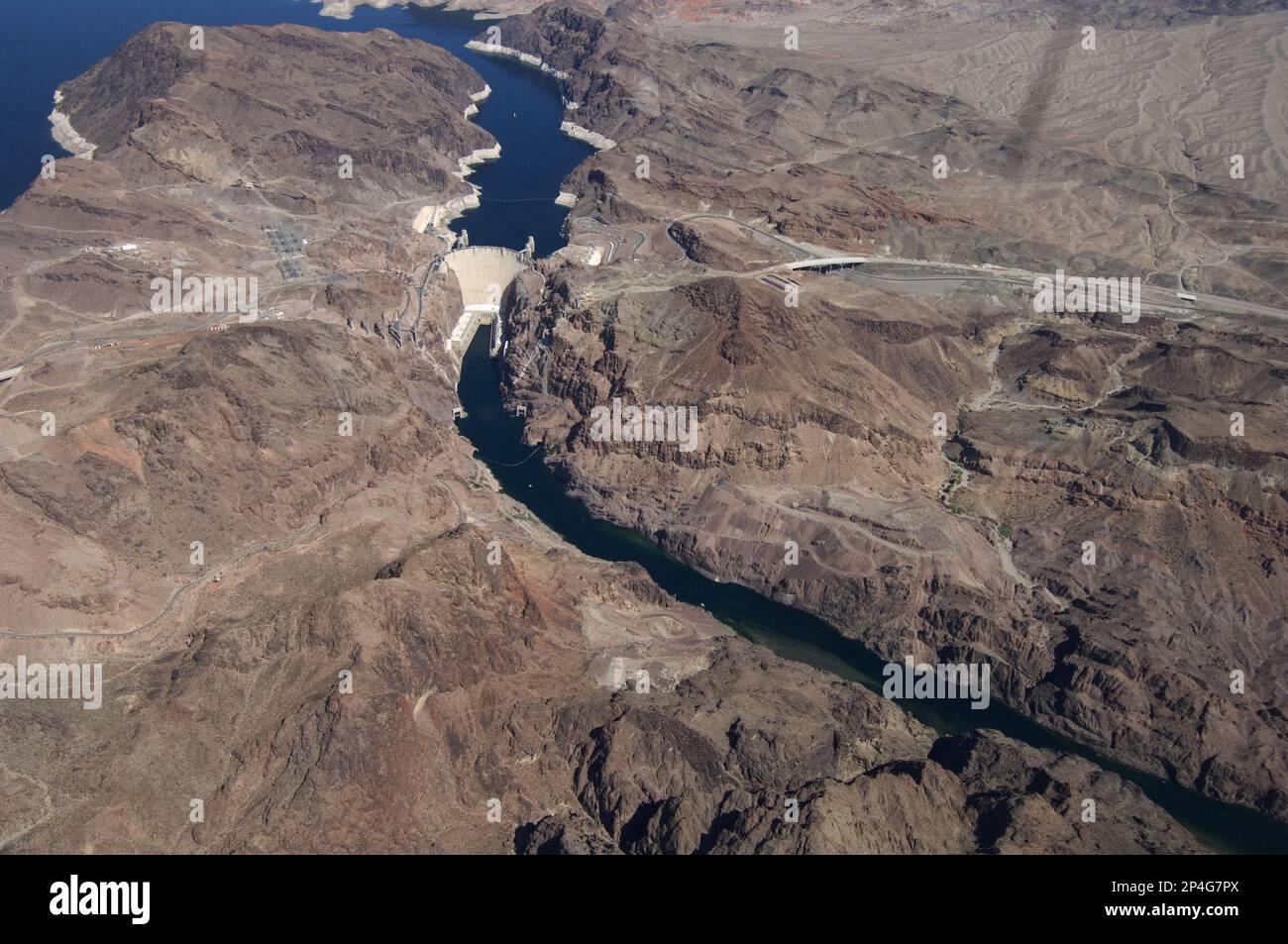 Aerial view of the arch gravity dam on the river, Hoover Dam, Black ...