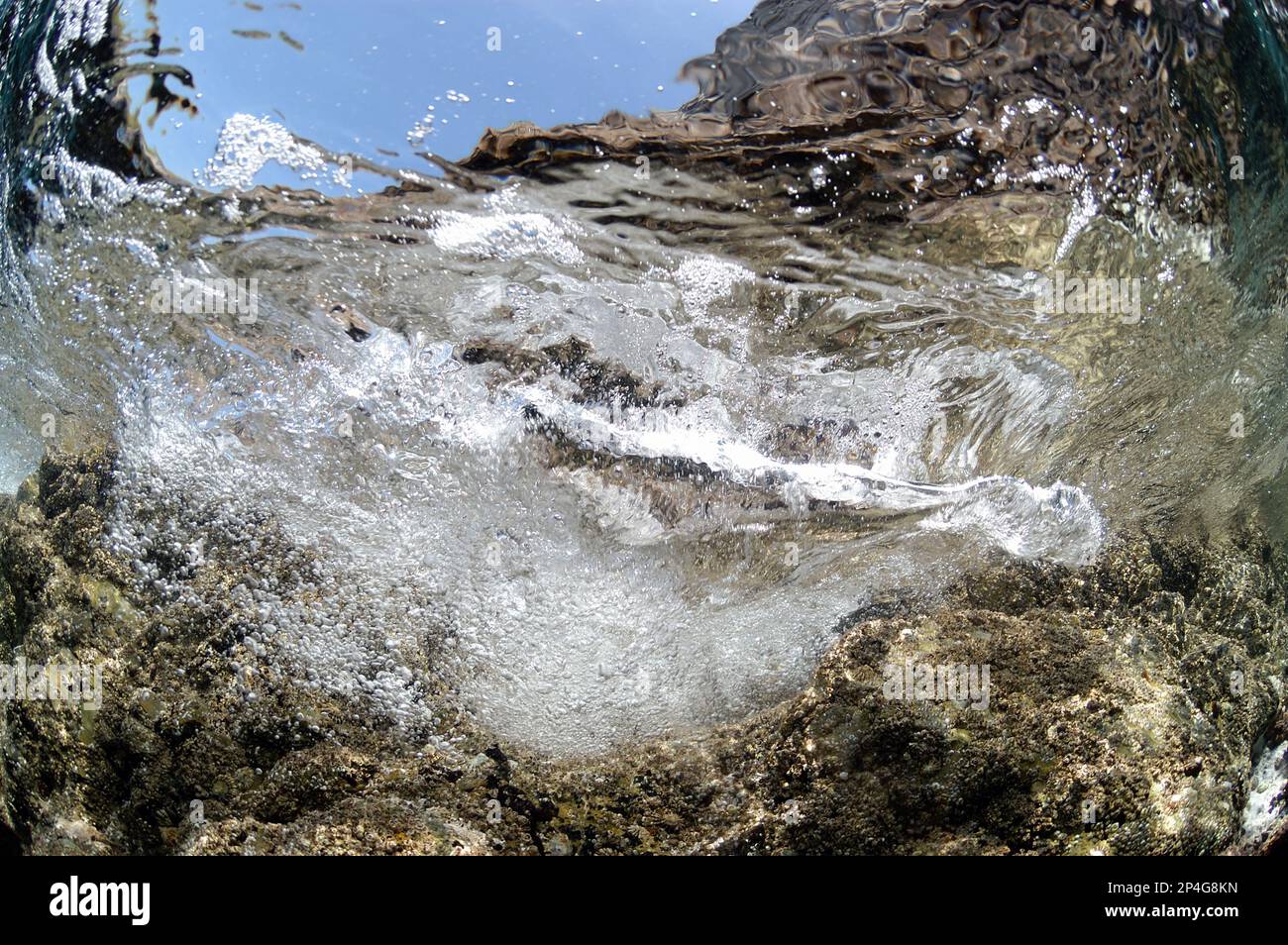 Wave breaking on rocky ledge underwater, Pondfield Cove, Isle of ...