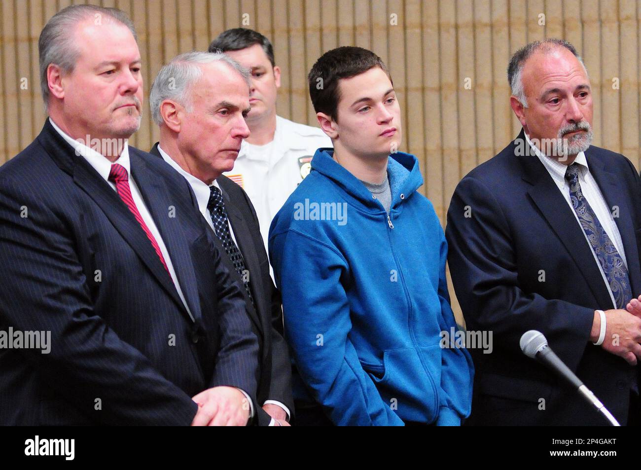 Christopher Plaskon, 16, second from right, stands with defense ...