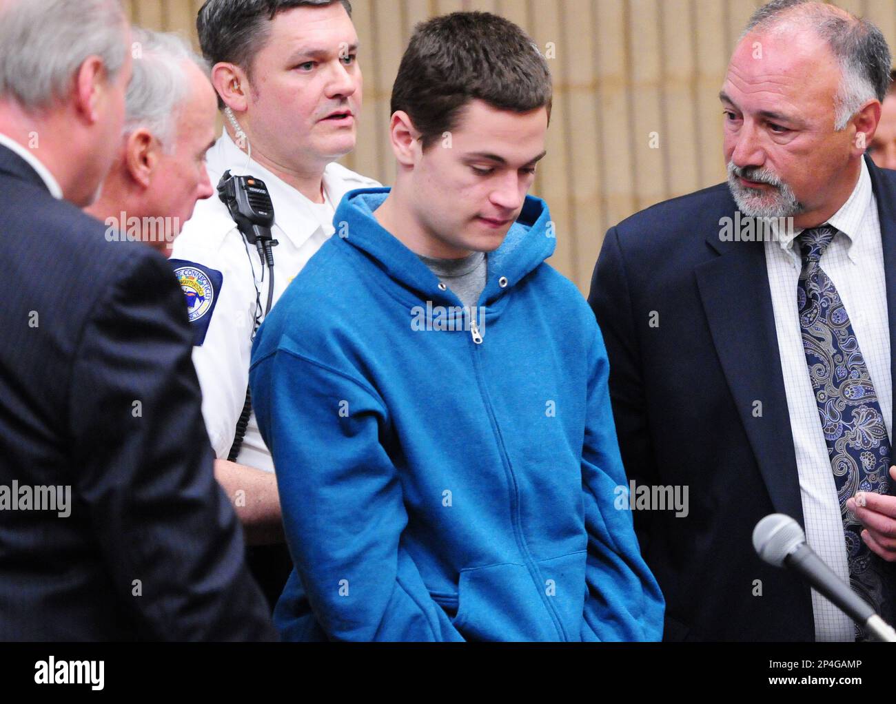 Christopher Plaskon, 16, second from right, stands with defense ...