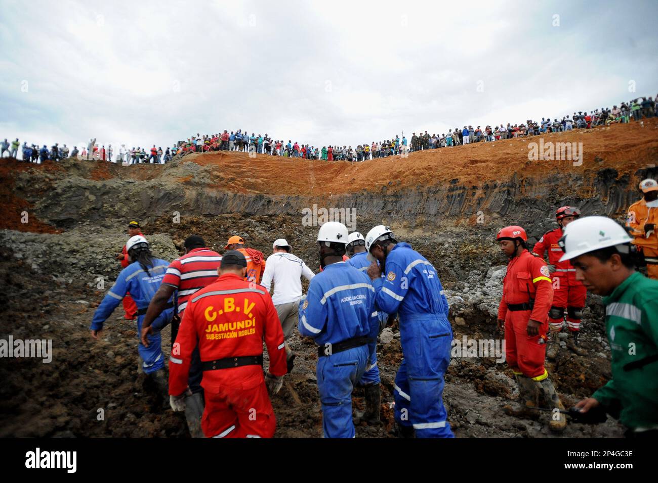 Rescue teams arrive to search for survivors at a collapsed illegal gold mine in Santander de ...