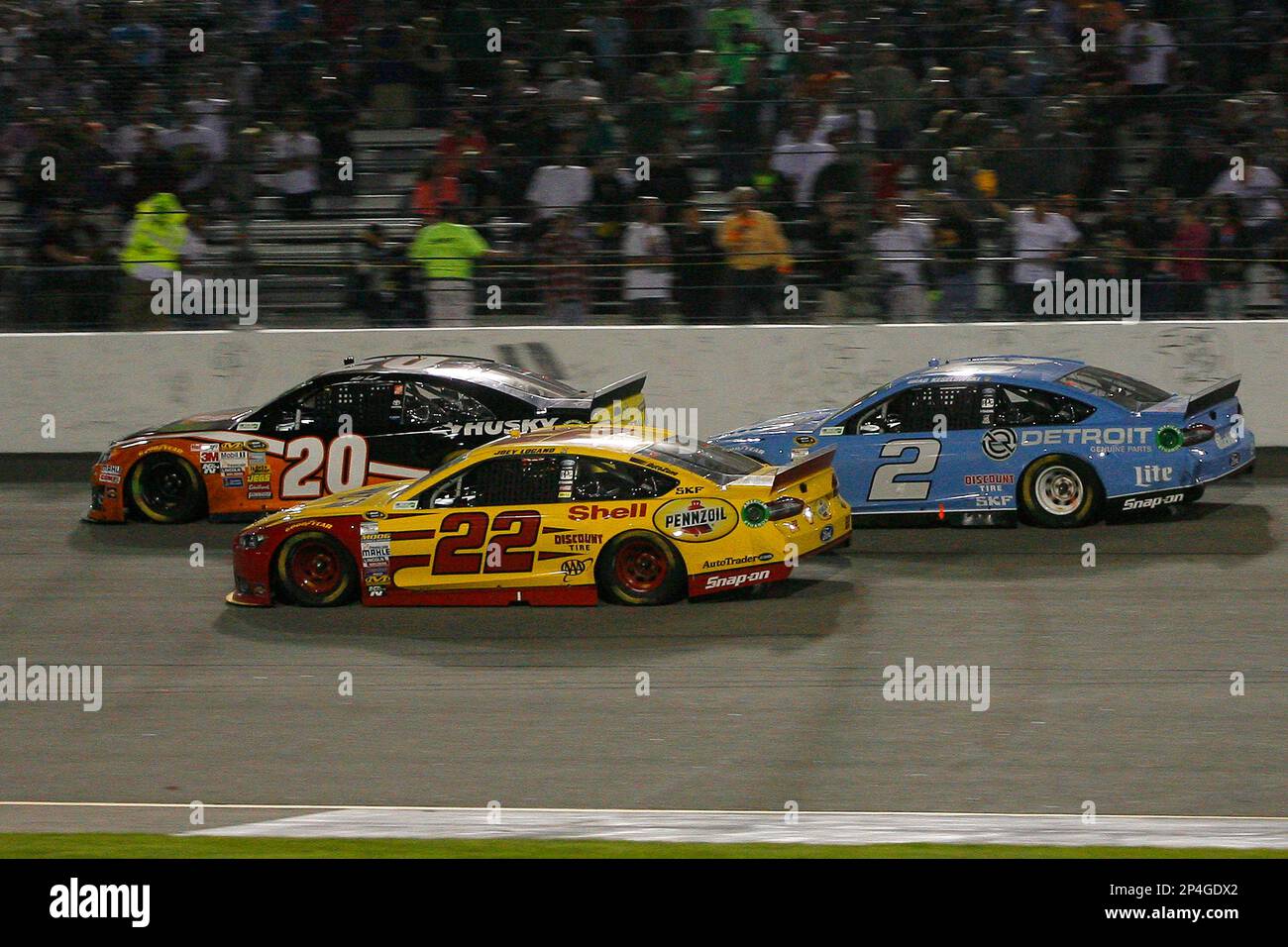 Matt Kenseth (20), Joey Logano (22) and Brad Keselowski (2) lead battle ...