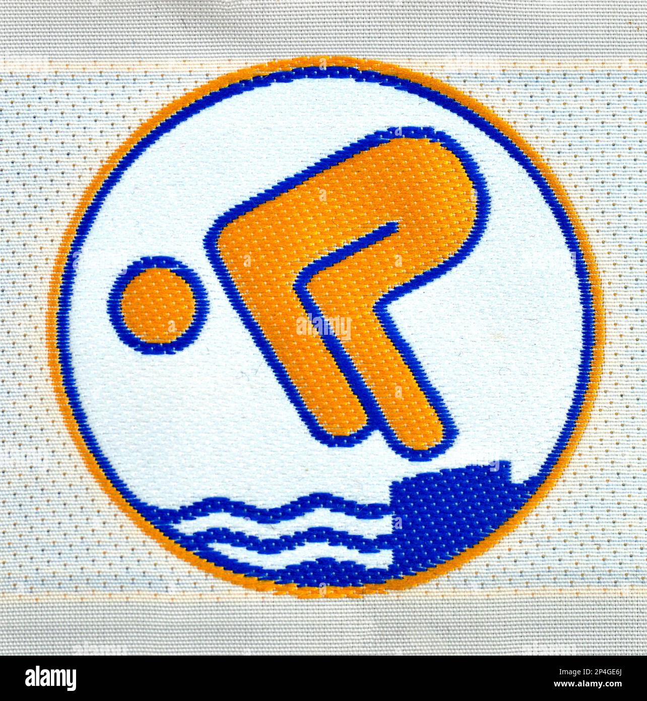 Gold swimming badge Stock Photo - Alamy