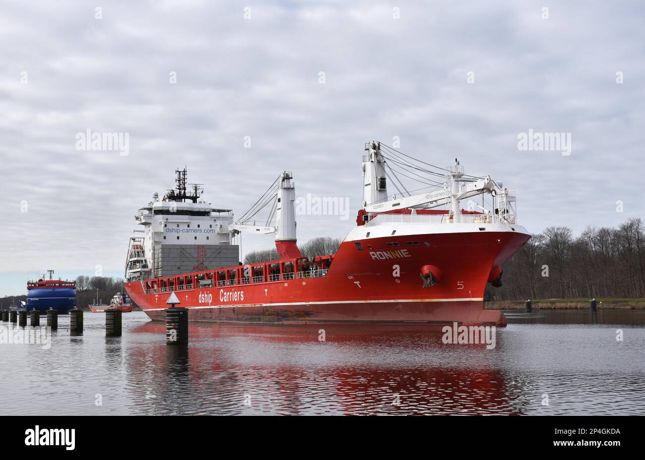 Cargo ship and tanker sailing through the Kiel Canal, Schleswig ...