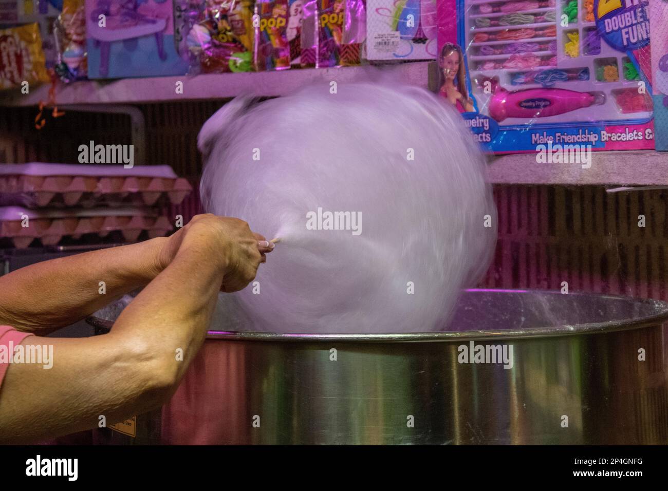 Cape Town, South Africa - an unidentified vendor makes candy floss at a ...