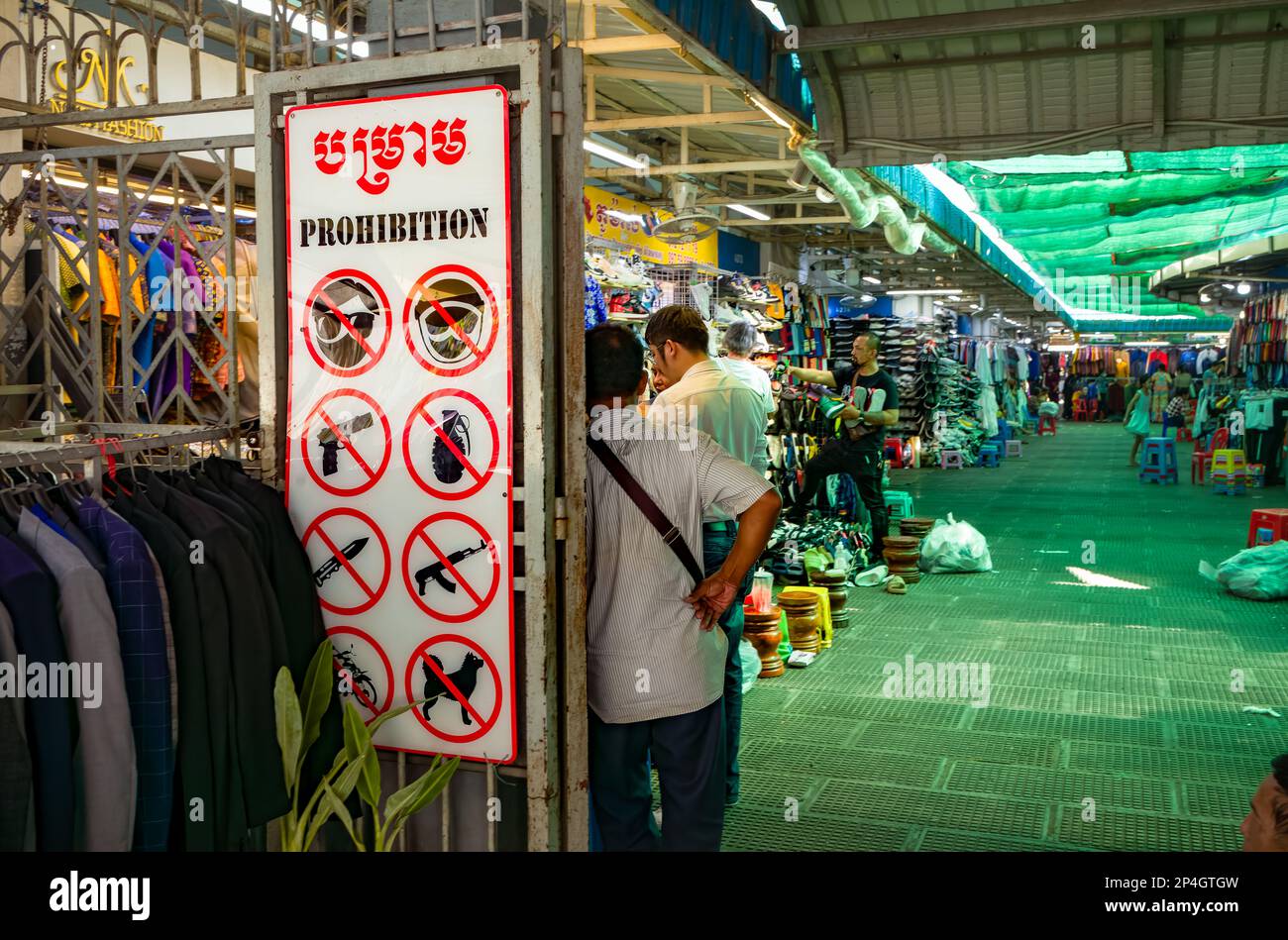 A sign warning people of the list of prohiobited items that cannot be ...