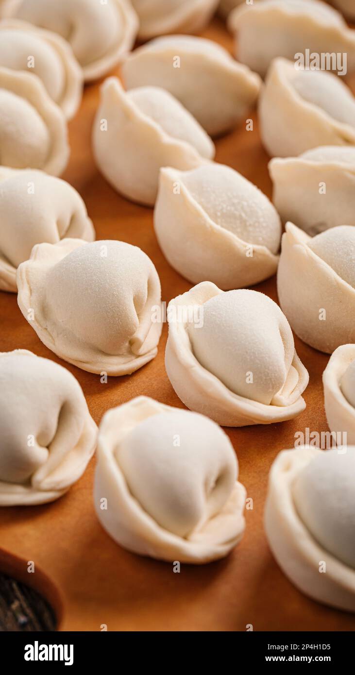Semi finished russian pelmeni dumplings Stock Photo - Alamy