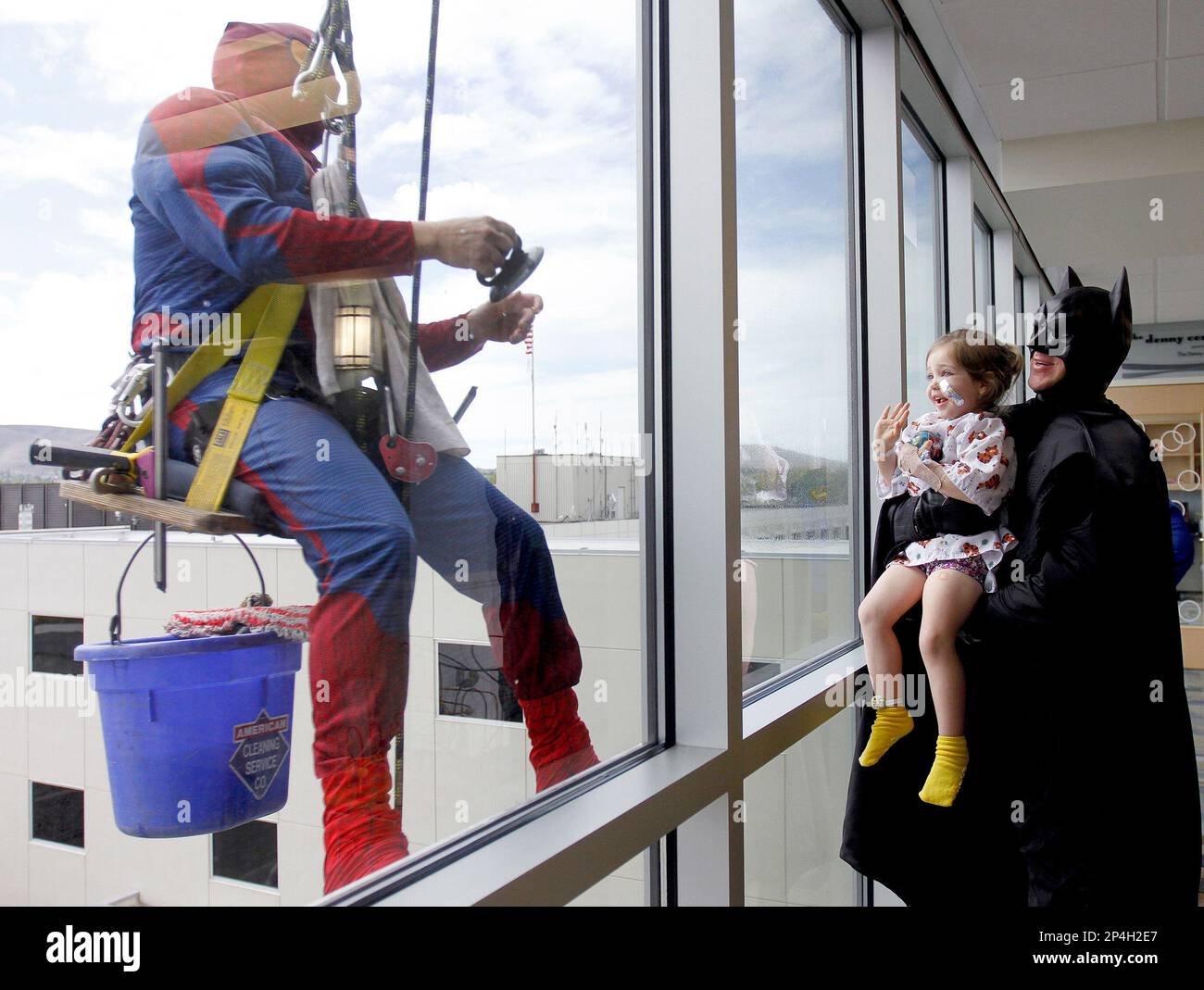 Rosie Highley, 3, of Pasco, gets a lift on Tuesday, April 22, 2014 ...