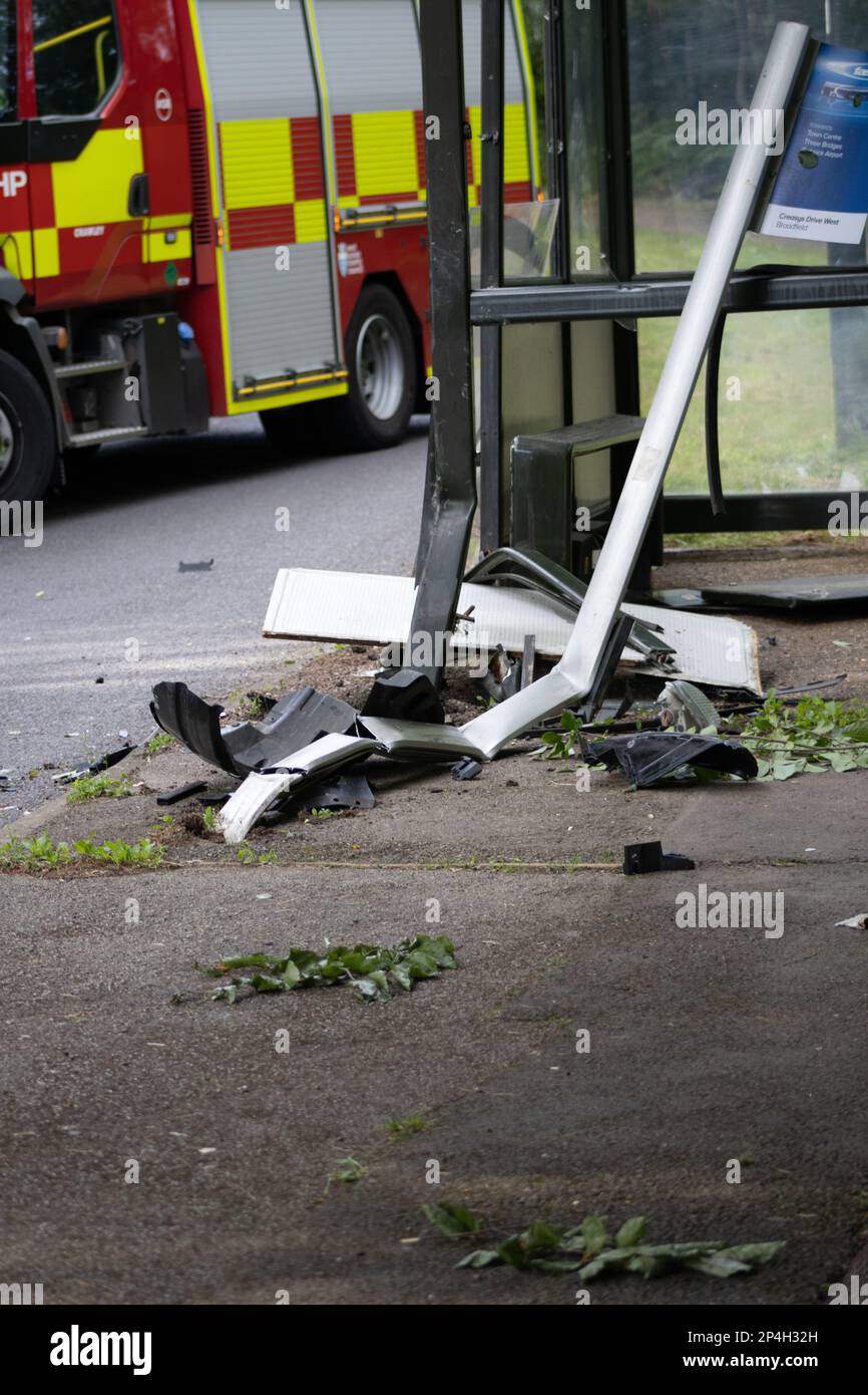 Car crash between car and bus stop. Police and fire & rescue in ...