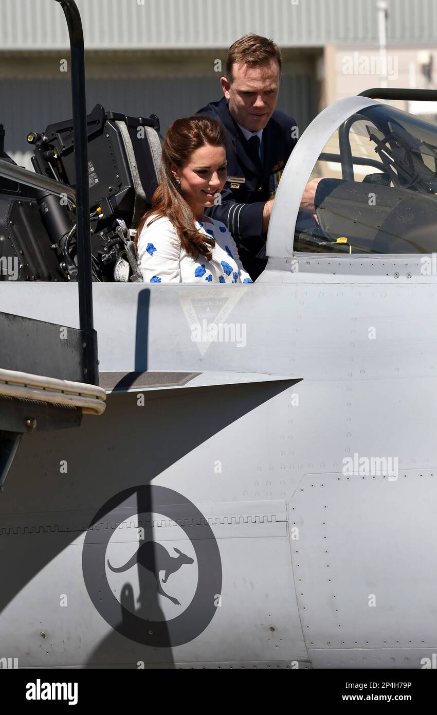 Wing Commander Stephen Chappell shows Britain's Kate, the Duchess of ...