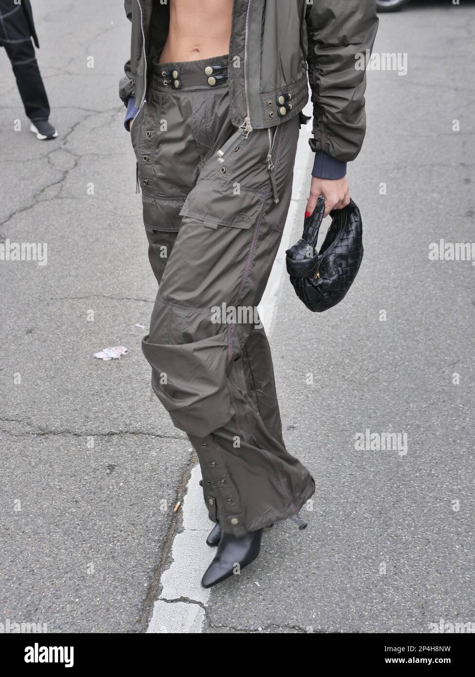 Fashion blogger posing for photographers before Diesel fashion show ...