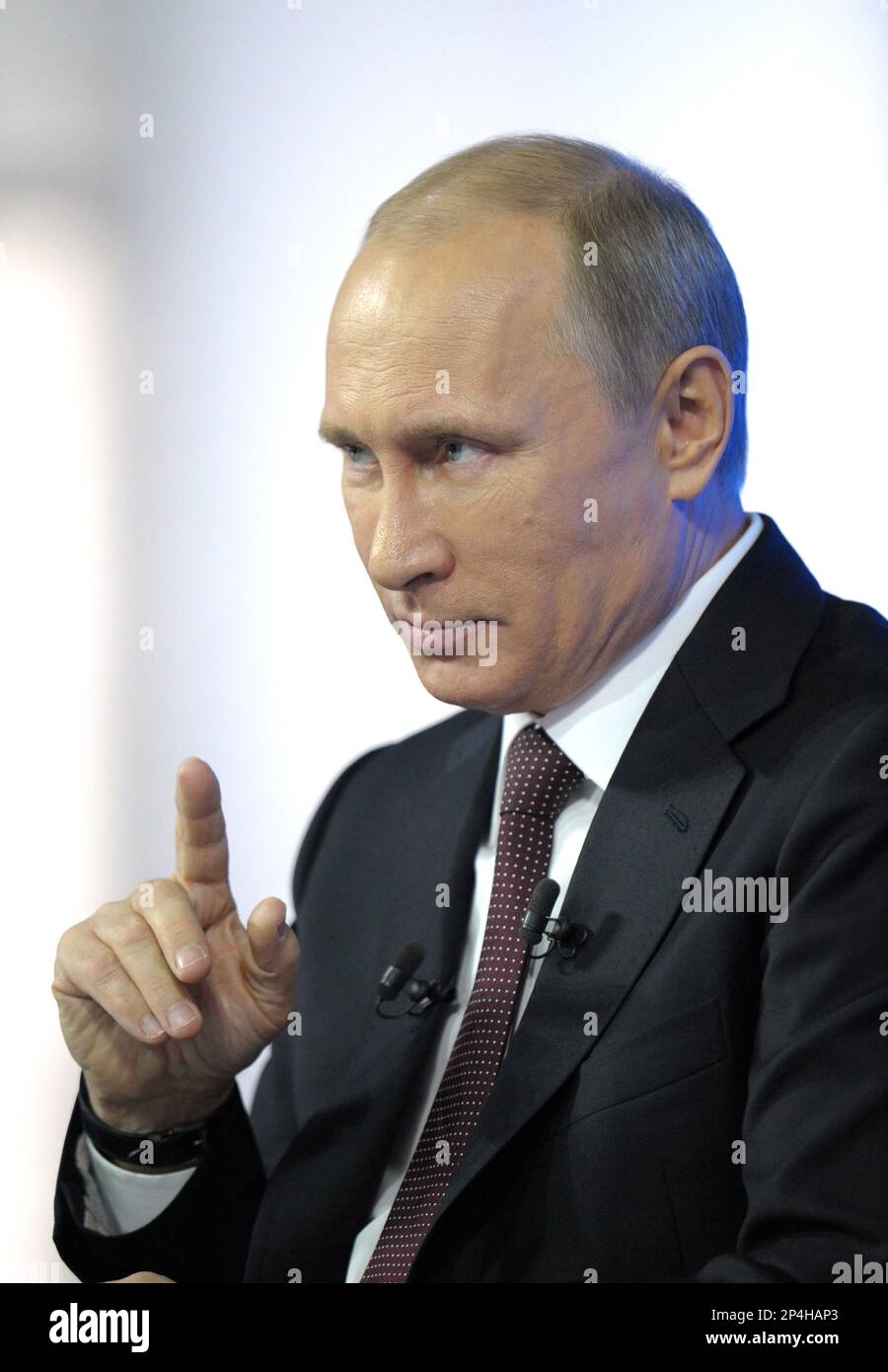 Russian President Vladimir Putin speaks during a nationally televised ...
