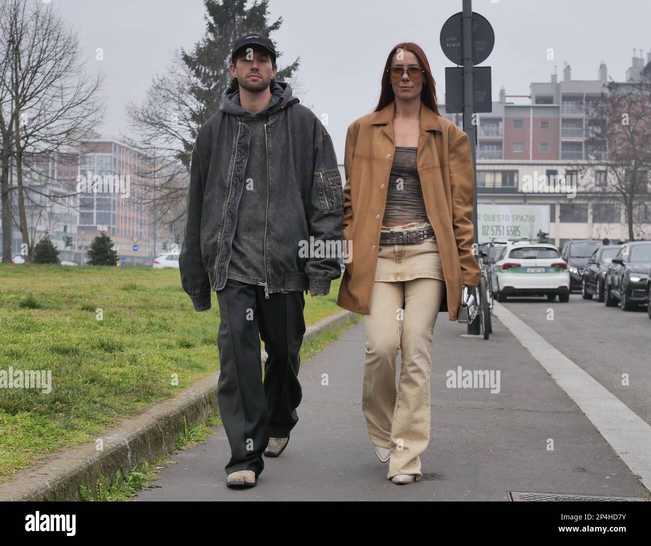 Fashion blogger posing for photographers before Diesel fashion show ...