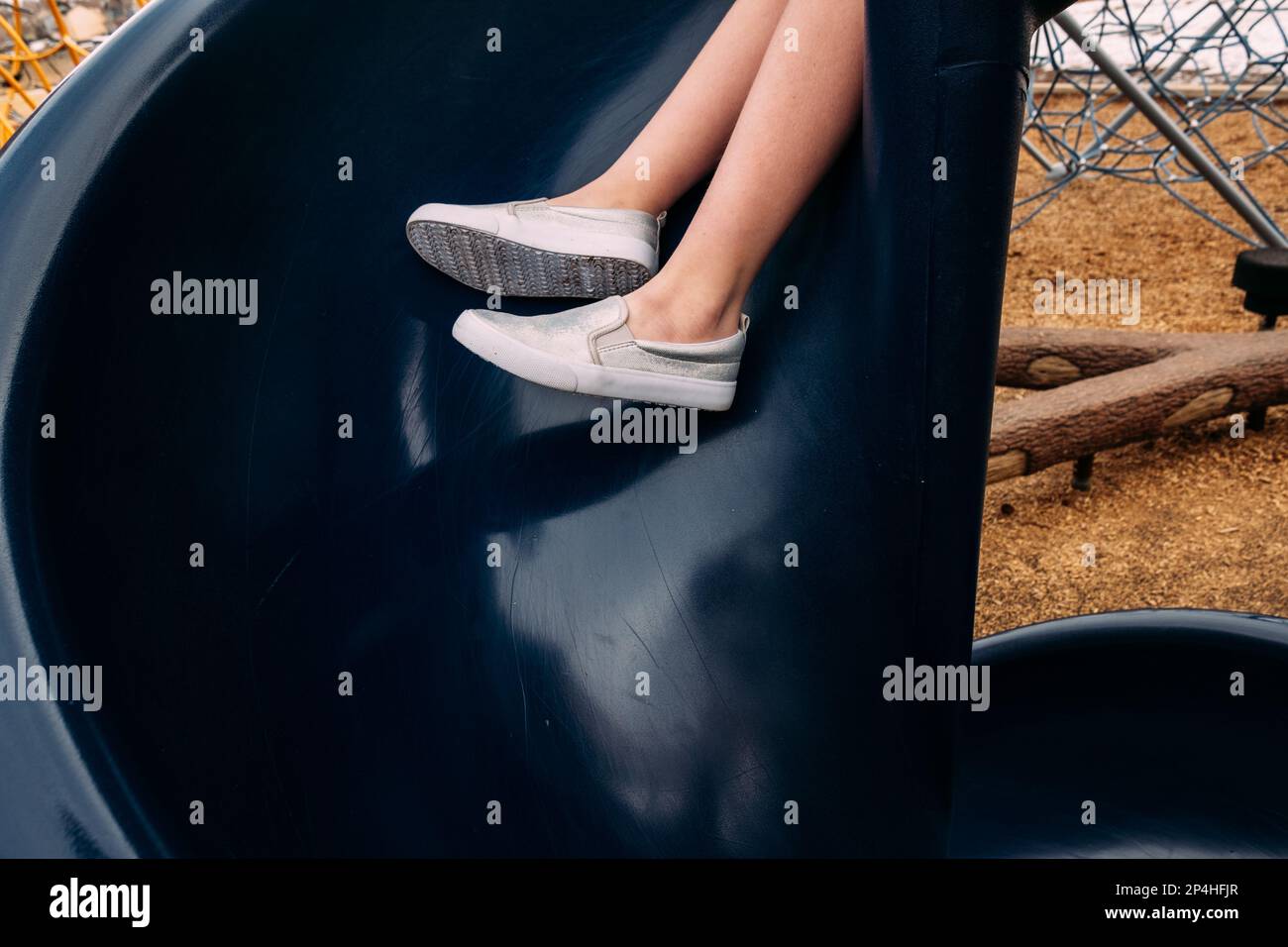 Going down the slide hi-res stock photography and images - Alamy