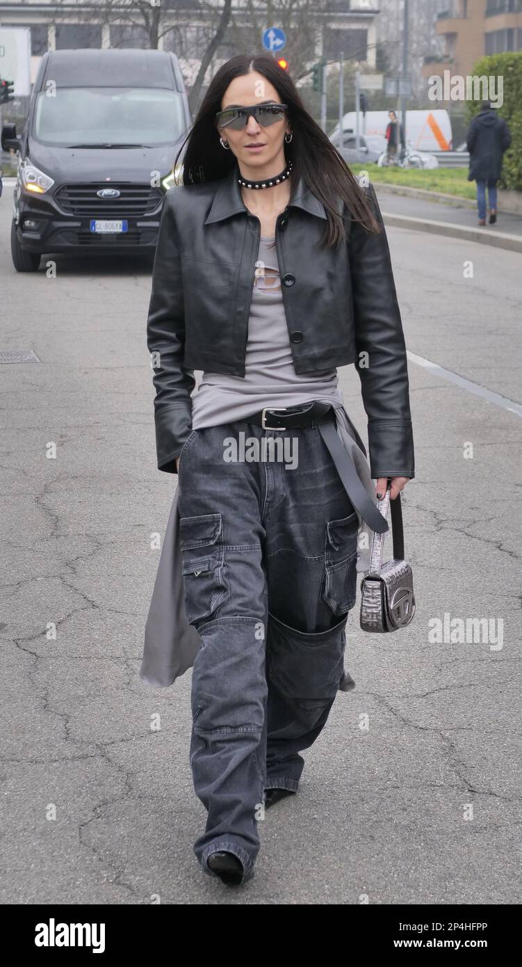 Fashion blogger posing for photographers before Diesel fashion show ...