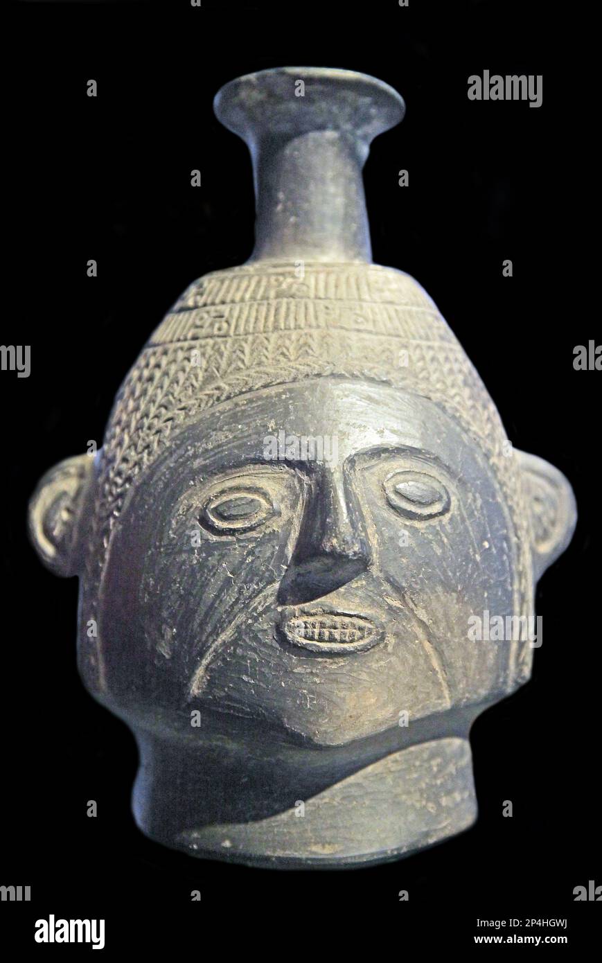 Vessel or Jar.It has the shape of a stylized male head.Inca/Peru.Dating ...
