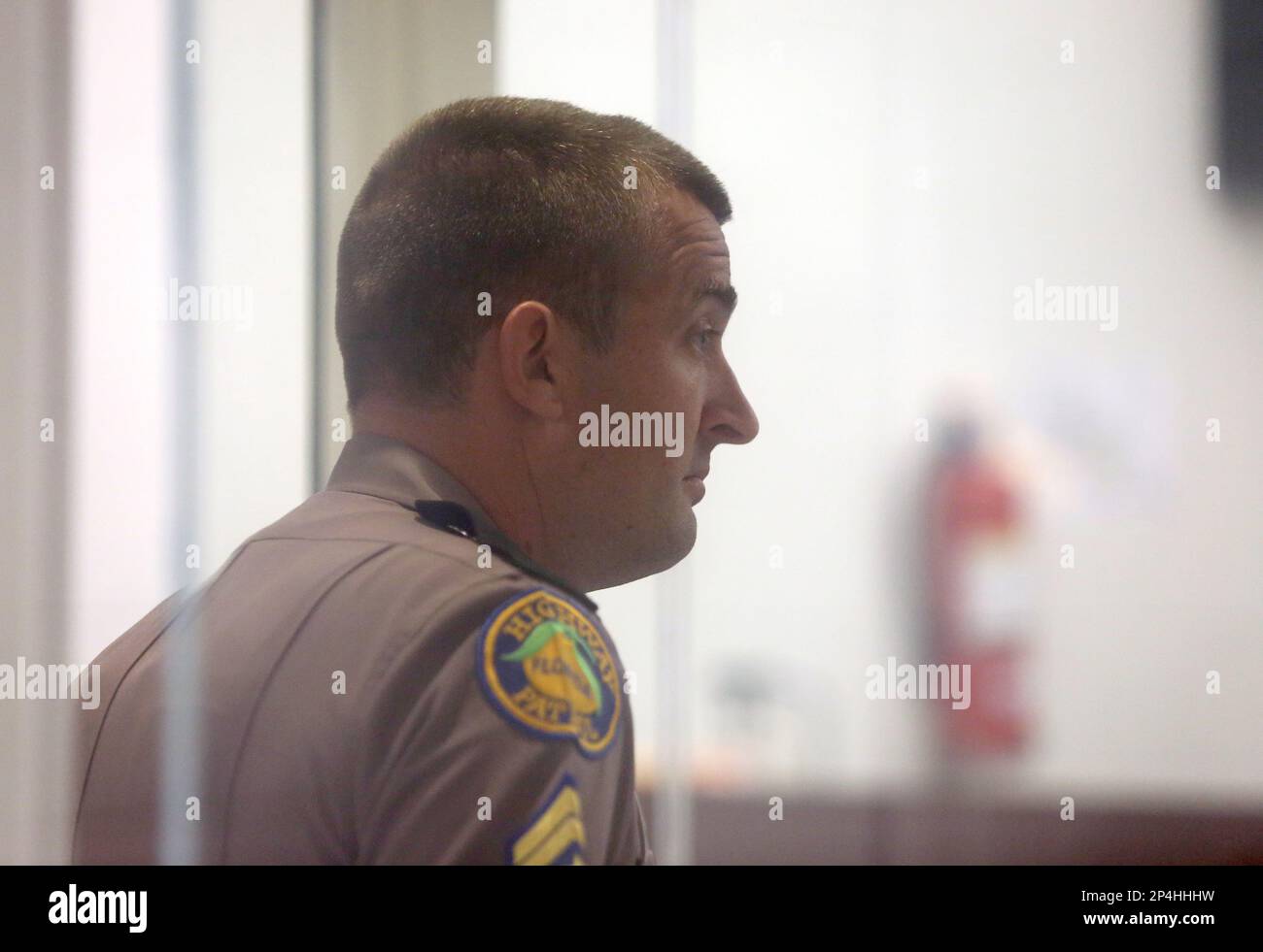 Cpl. Brian Gensler of the Florida Highway Patrol testifies during a ...