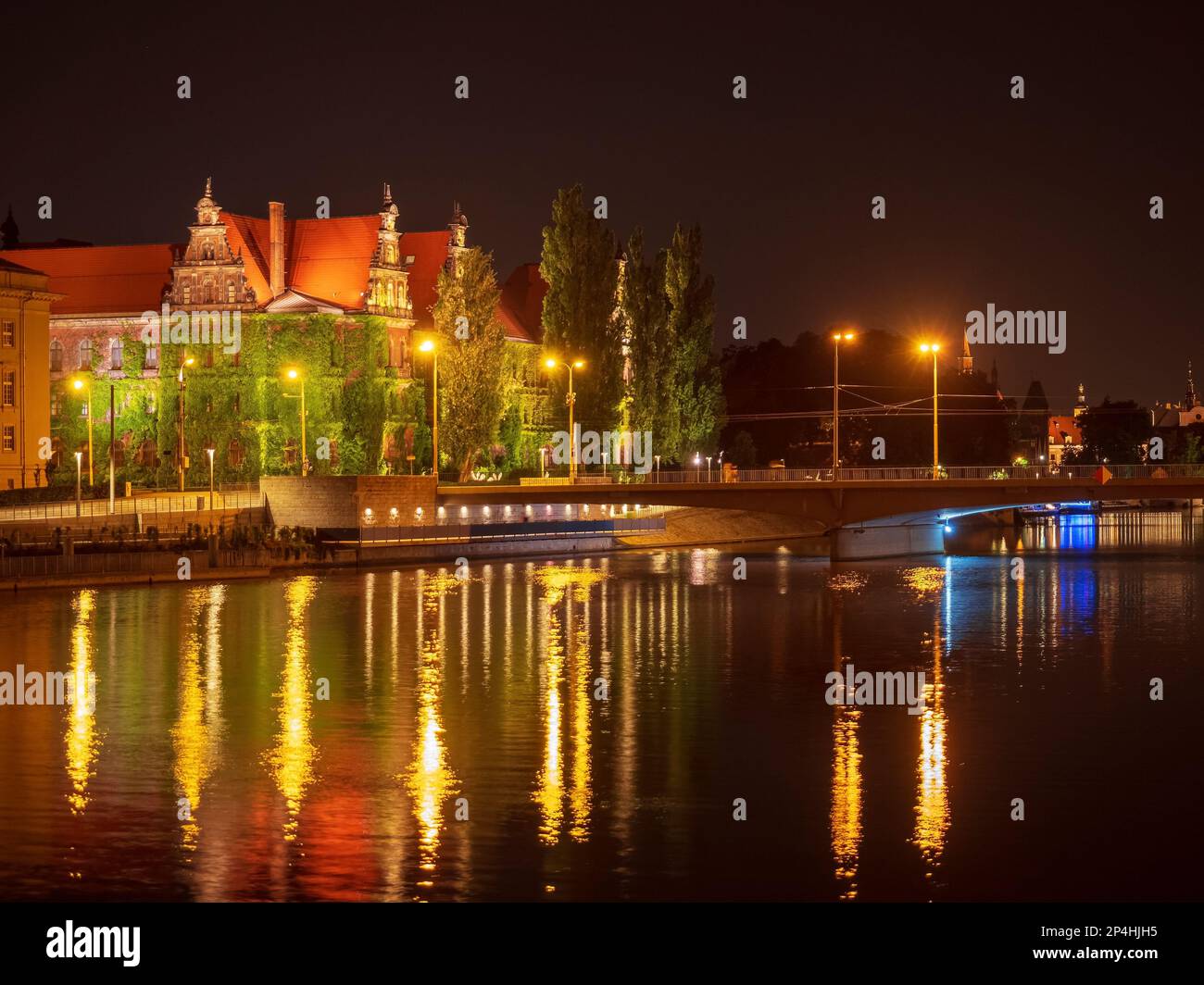 Wroclaw city night view on Oder river and National Museum. Wroclaw or ...