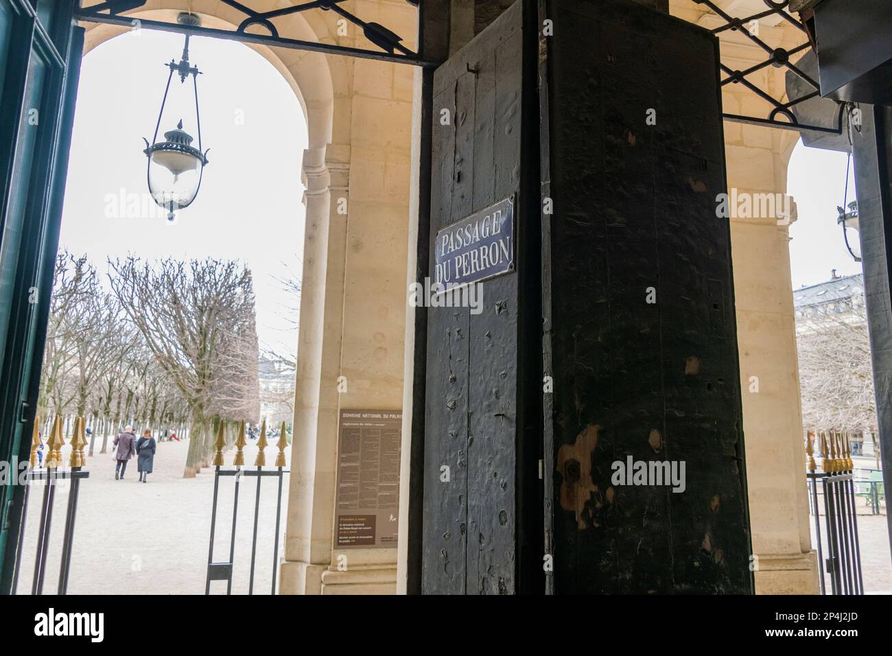 The entrance to Palais Royal garden from Passage du Perron in the 1st ...
