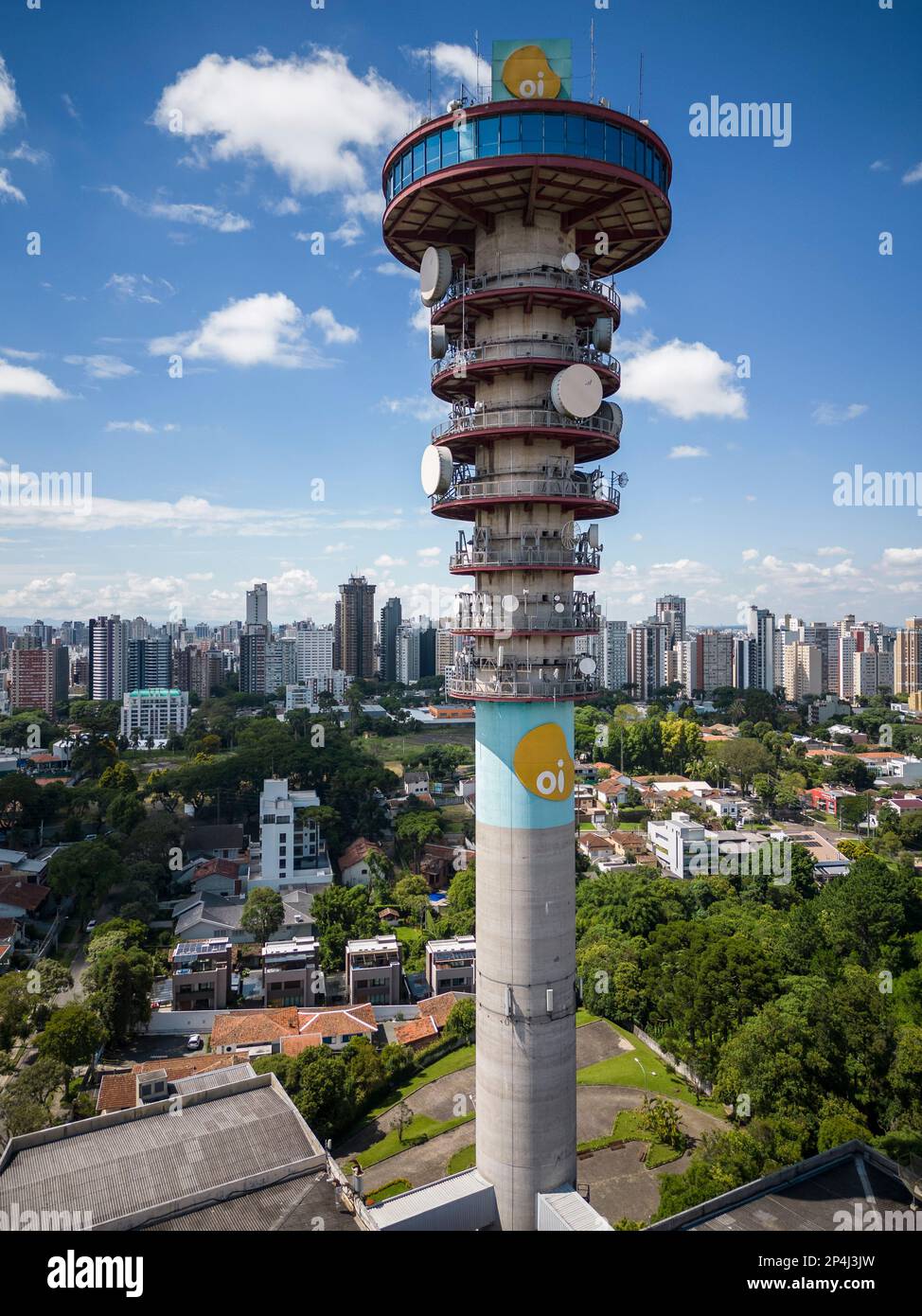 Beautiful view to communications tower, antennas and city buildings ...