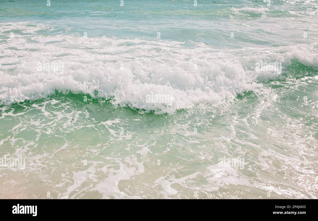 watching the waves on the beach Stock Photo - Alamy