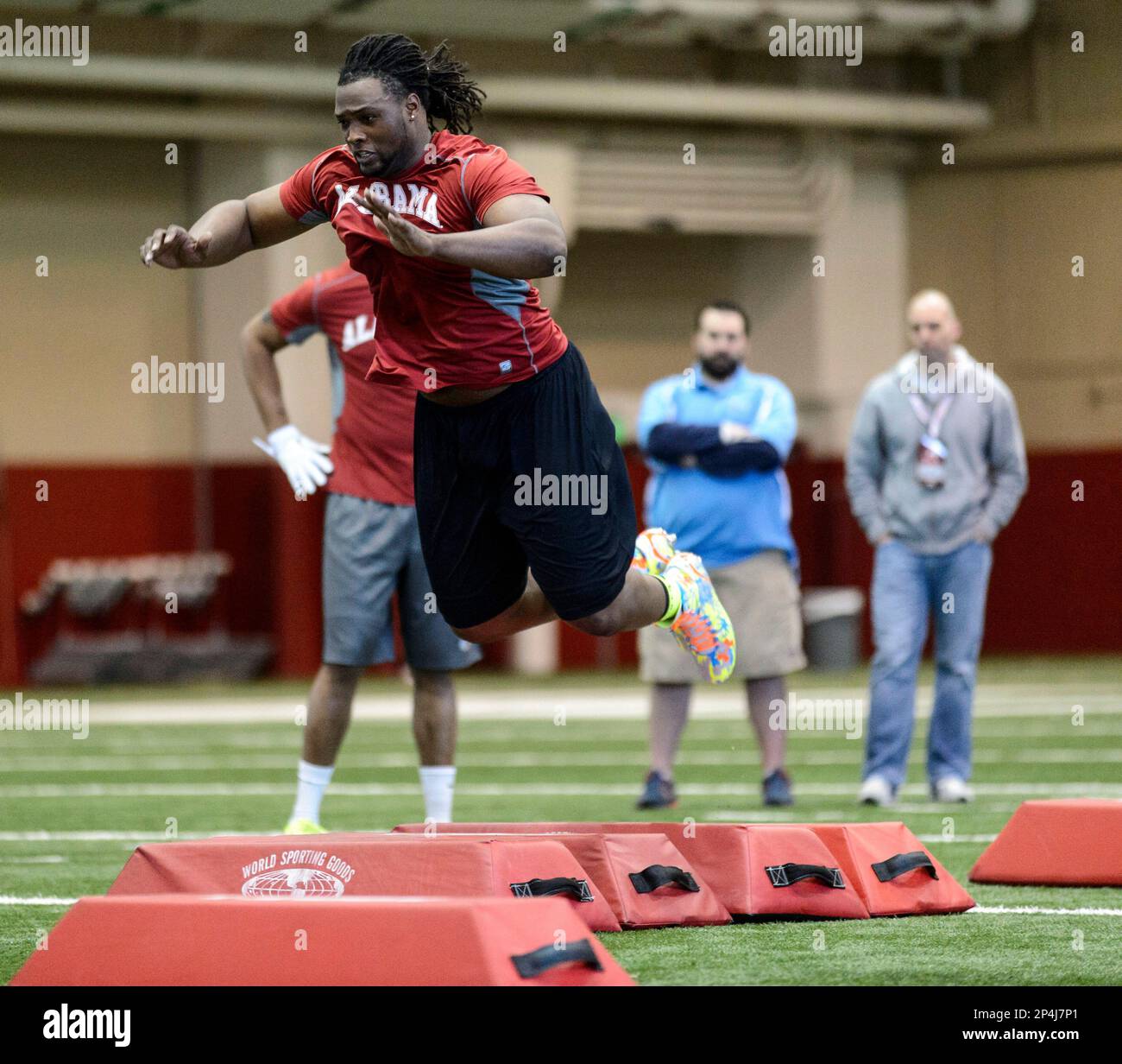 Alabama's Ed Stinson works through position drills during a pro day for ...