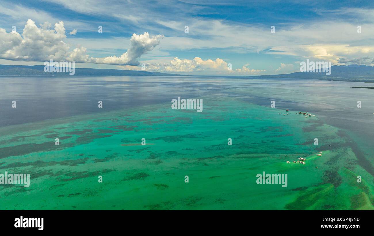 Aerial view of sandbar in the blue sea. Seascape with Manjuyod sandbar ...