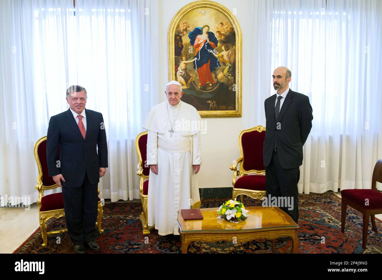 Pope Francis, center, meets King Abdullah II of Jordan, left, and ...