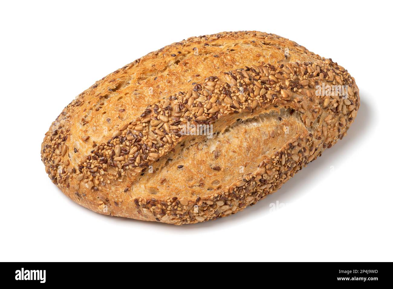 Fresh whole loaf of country bread, pain de campagne, covered with seeds ...
